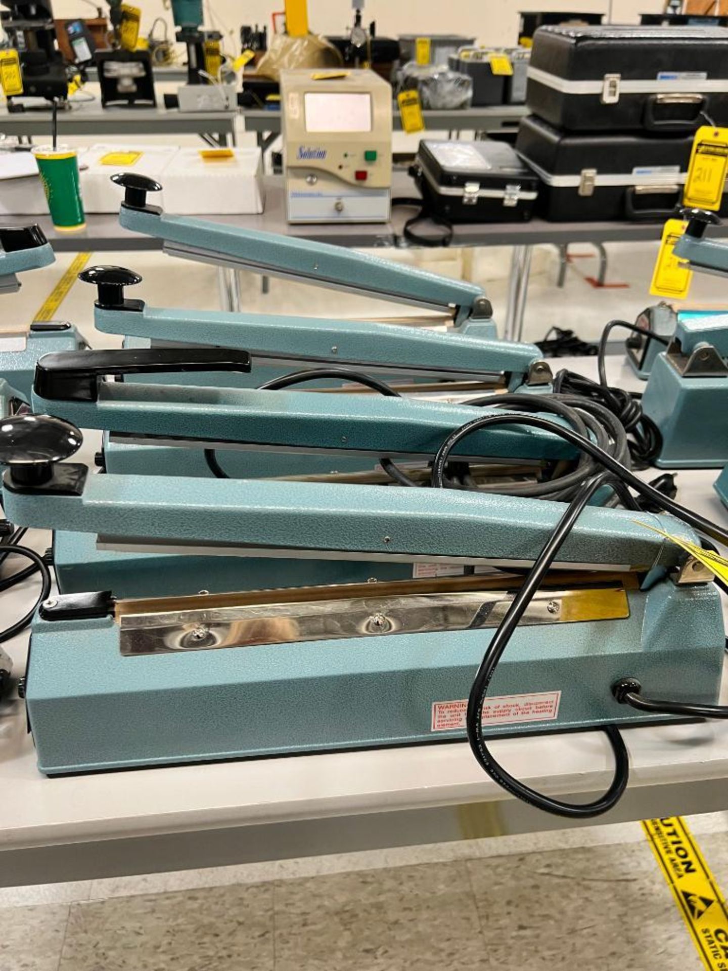{ Group of lots: 306, 307, 308 } (4x) Uline 12" Impulse Sealers, Model ...
