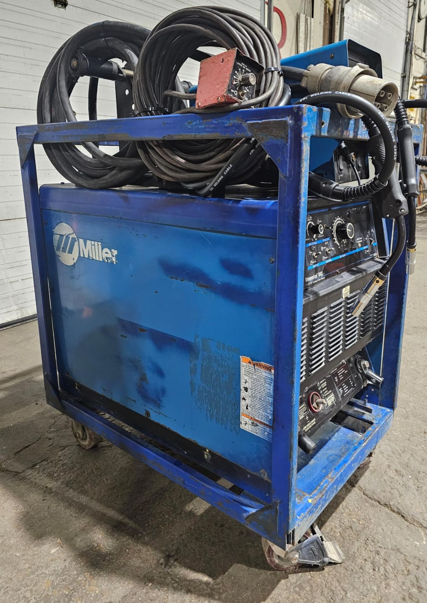 Miller Dimension 652 Mig Welder with DUAL 70 Series 4-Wheel Wire Feeder ...