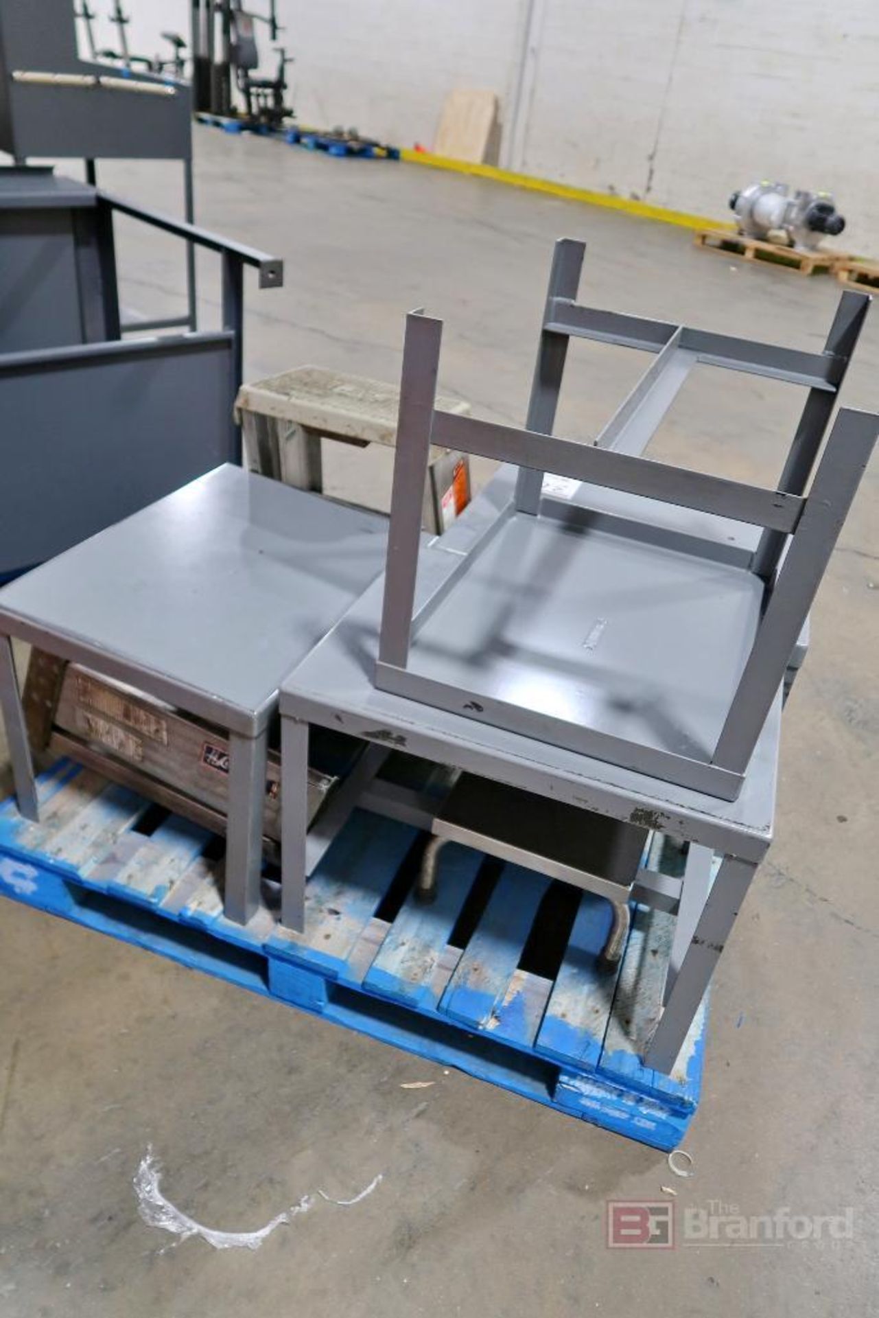 Pallet Of Assorted Steel Tables And Step Ladders