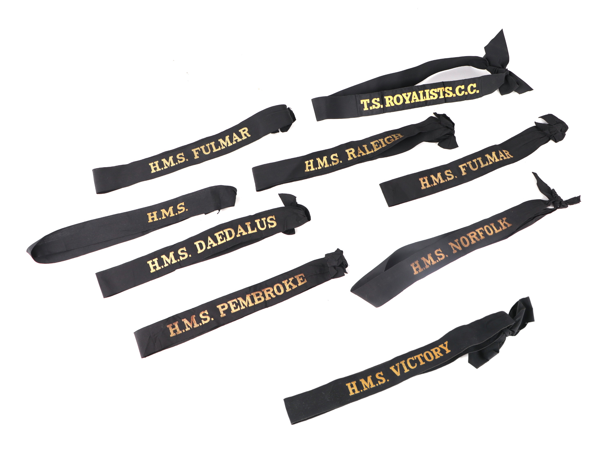 A collection of Royal Navy cap tallies including: HMS, NORFOLK ...