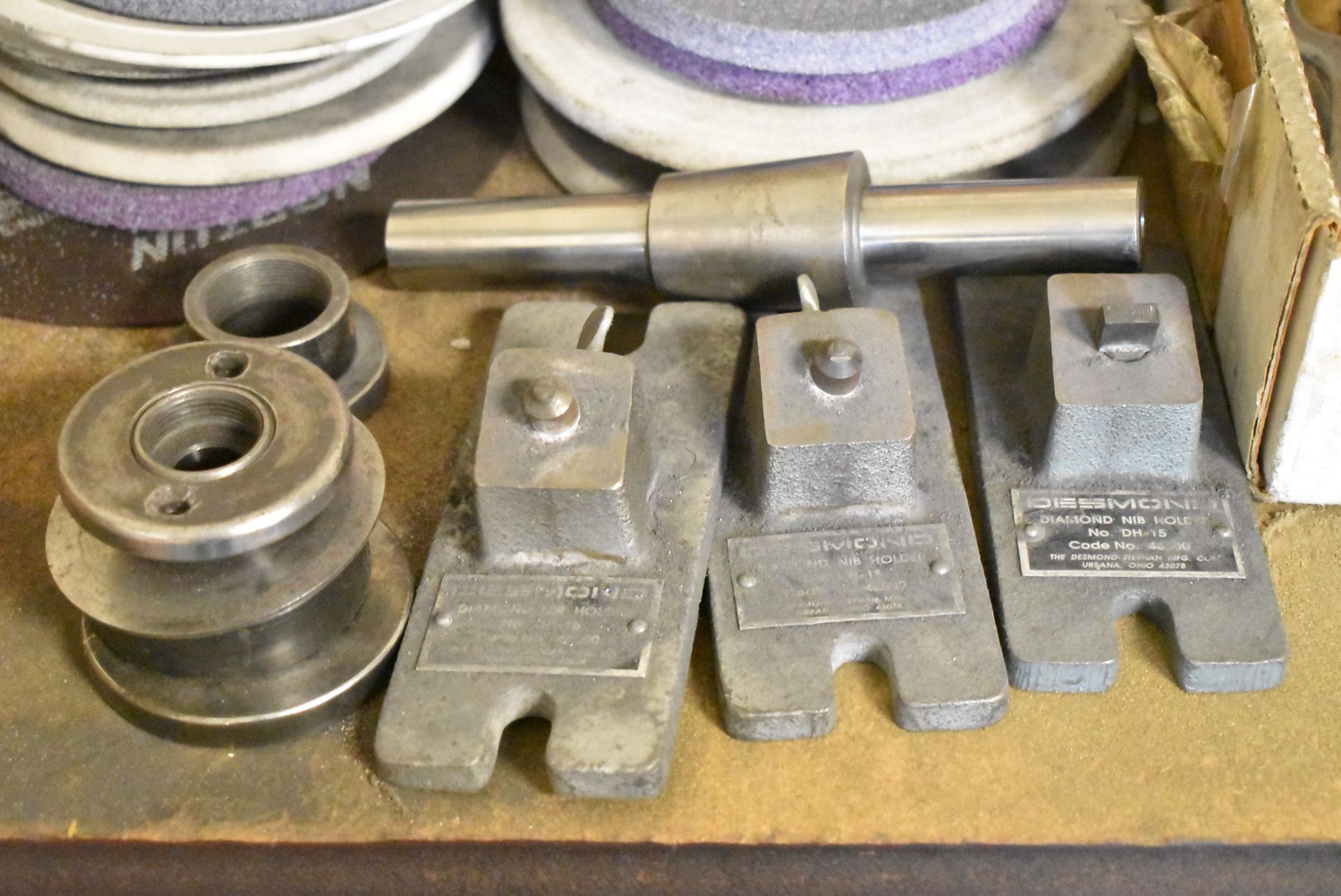 LOT/ TOOL CABINET WITH GRINDING WHEELS, HUBS, SPANNERS, DIAMOND NIB ...