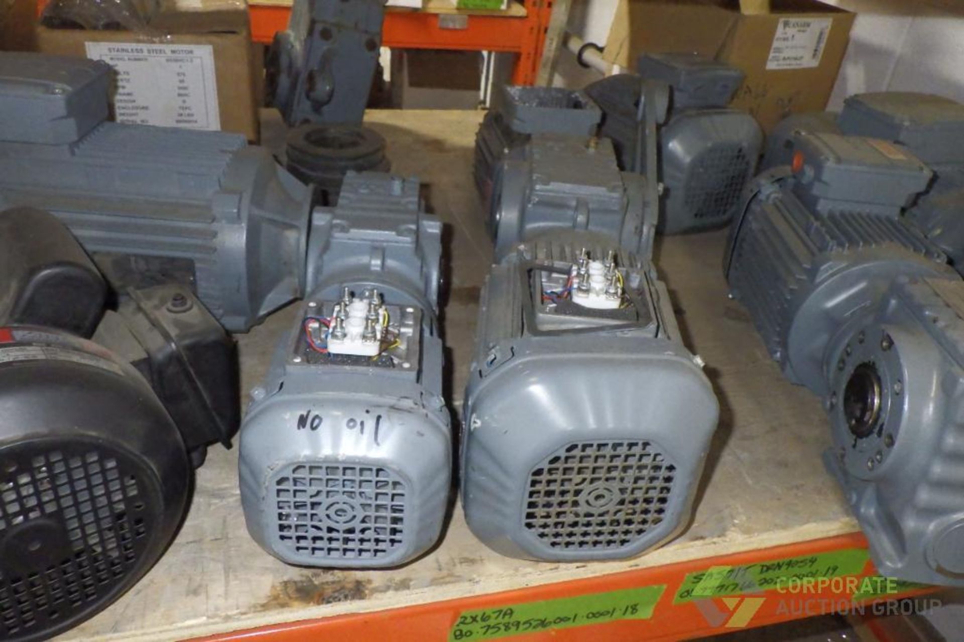 Contents of 1 shelf of motors, including new and used motors, and new ...