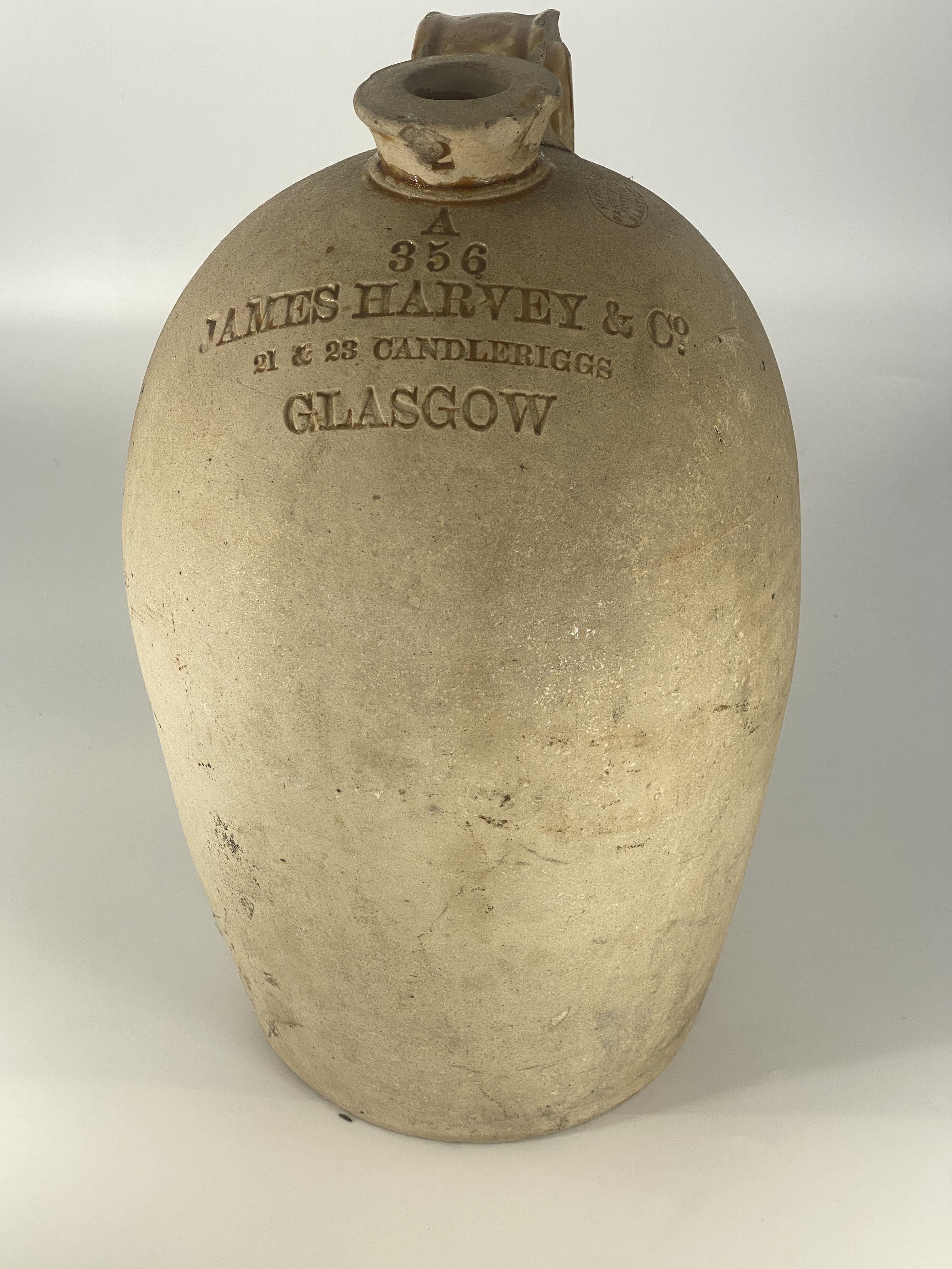 A whisky flagon, James Harvey Glasgow
