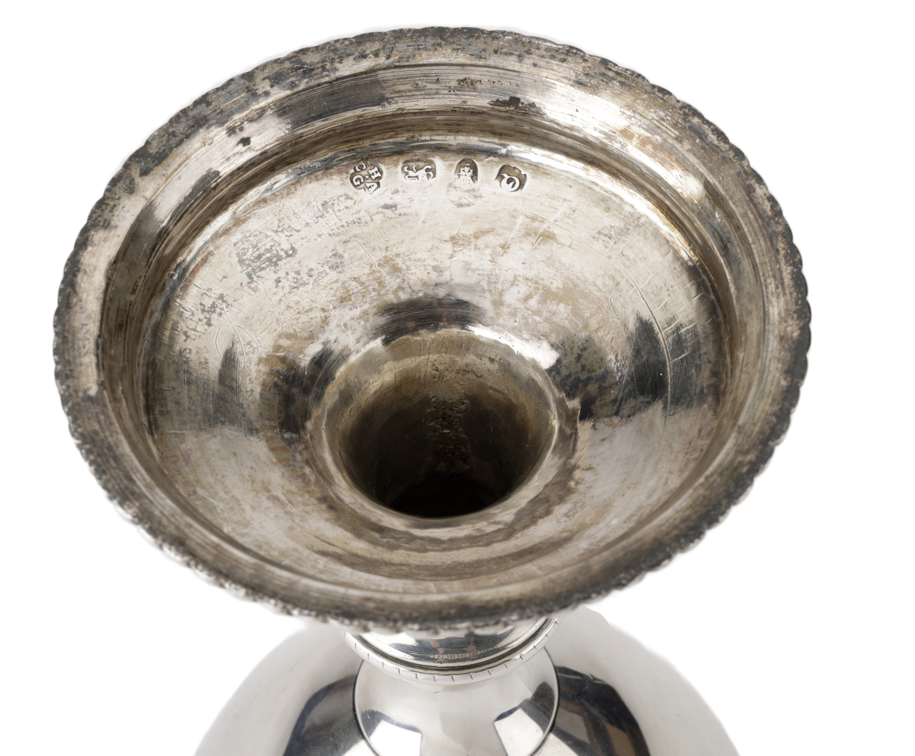 A pair of George III silver wine goblets, the plain bowls engraved with ...