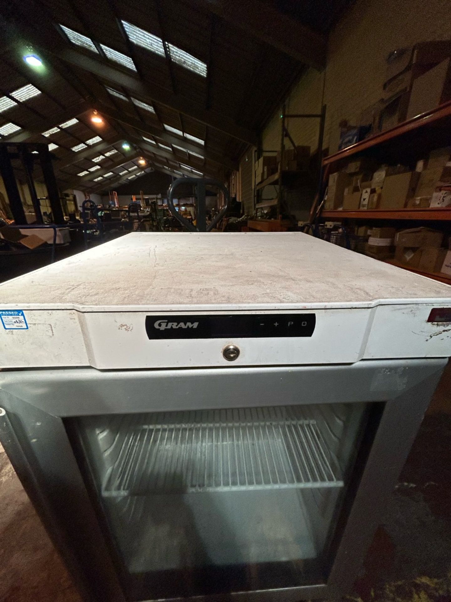 Gram KG210 LG 3W glass front under counter fridge.