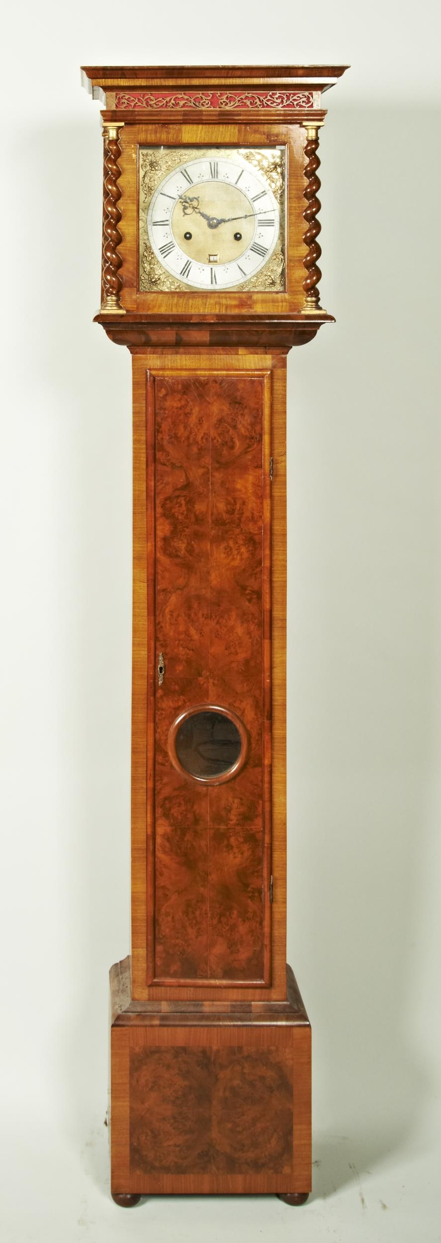 AN 8 DAY WALNUT LONGCASE CLOCK, 10 inch dial signed Jonathan Lownds in ...