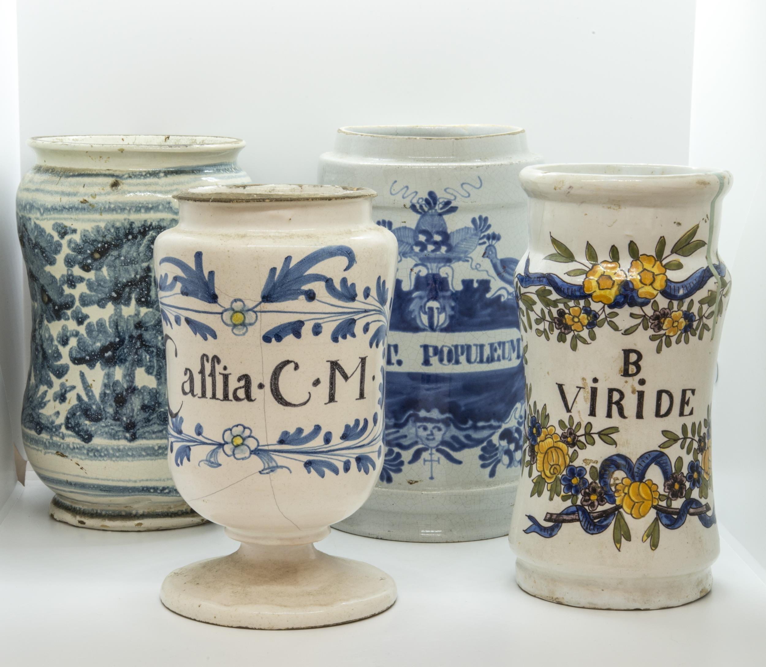 FOUR DRUG JARS 17th century and later, tallest is 22cms high