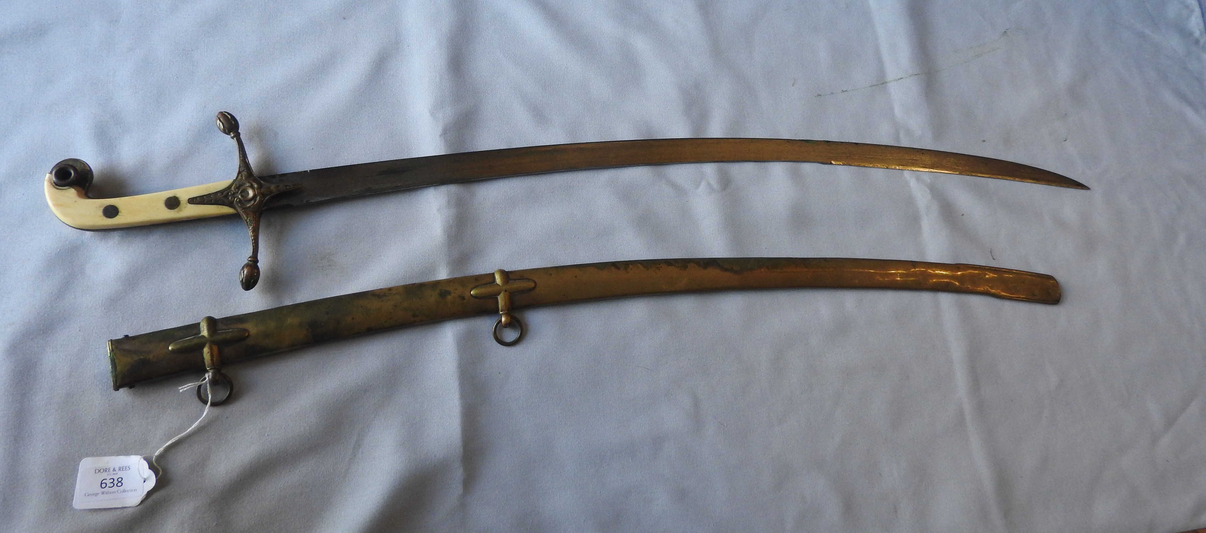 A 'MAMLUKE' STYLE SWORD BY MOORE & CO., with ivory grip, etched blade ...