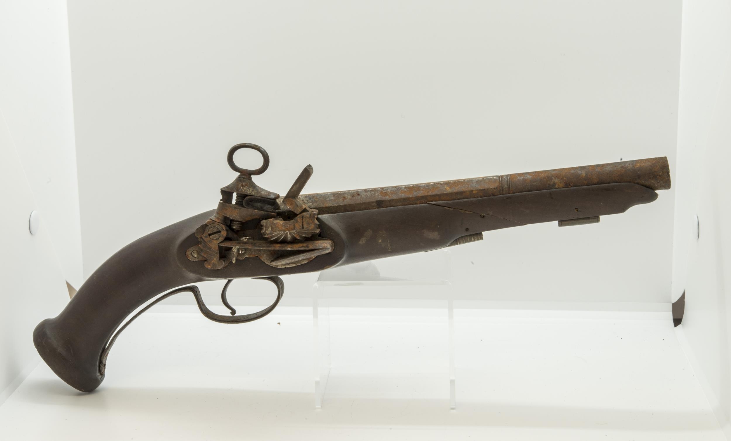 A FLINTLOCK PISTOL, the lock unmarked, with brass trigger guard and ...