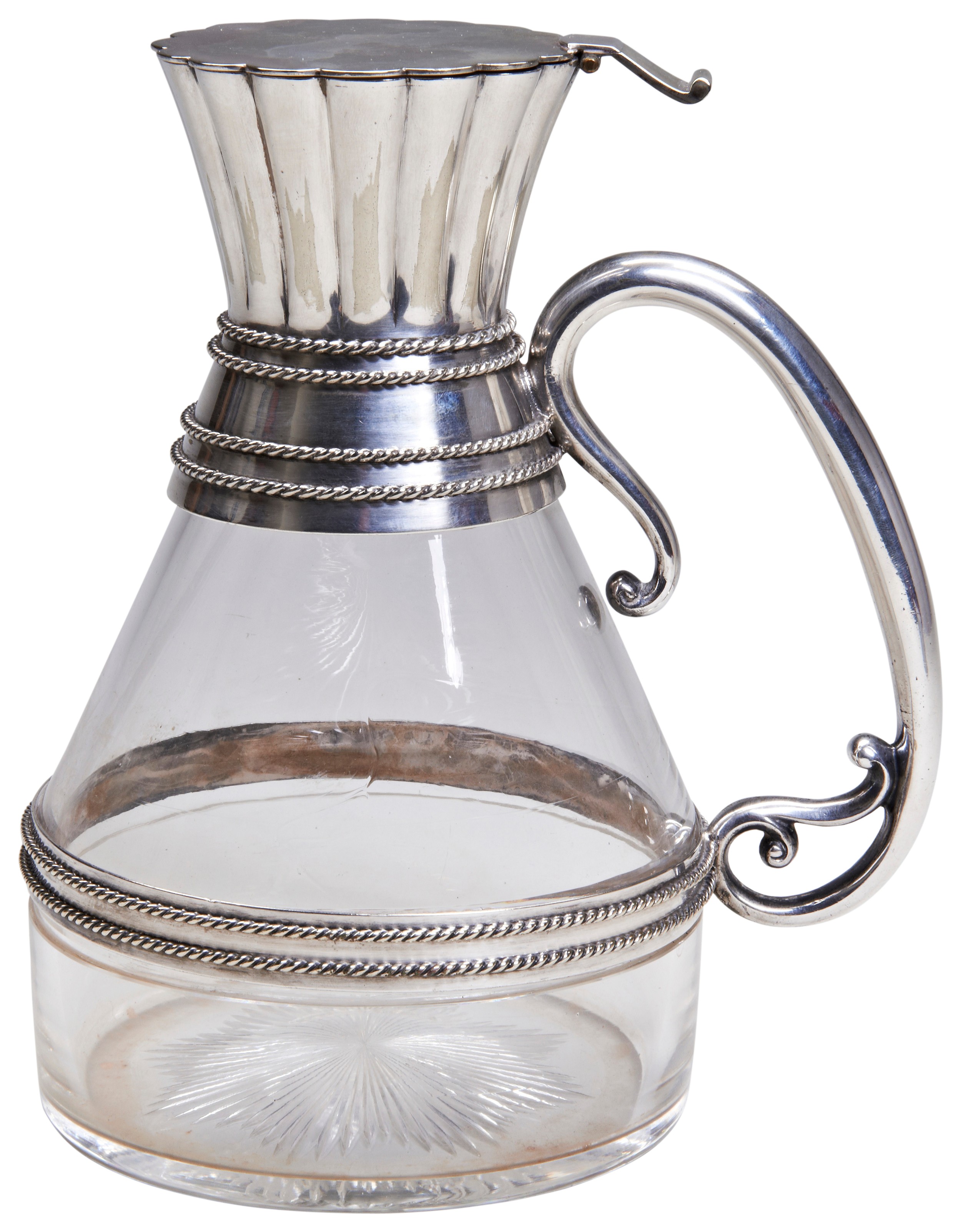 AN ELECTRO-PLATE MOUNTED GLASS CLARET JUG DESIGNED BY DR C. DRESSER ...