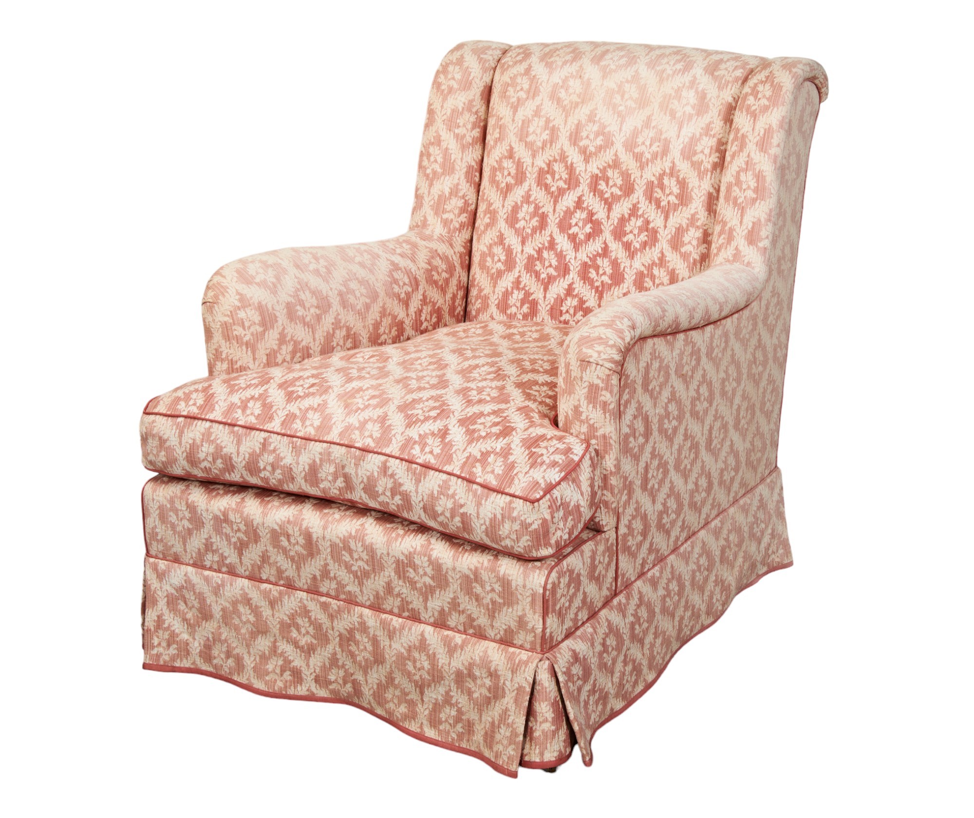 A PORTMAN UPHOLSTERY ARMCHAIR covered in a pale lattice patterned ...