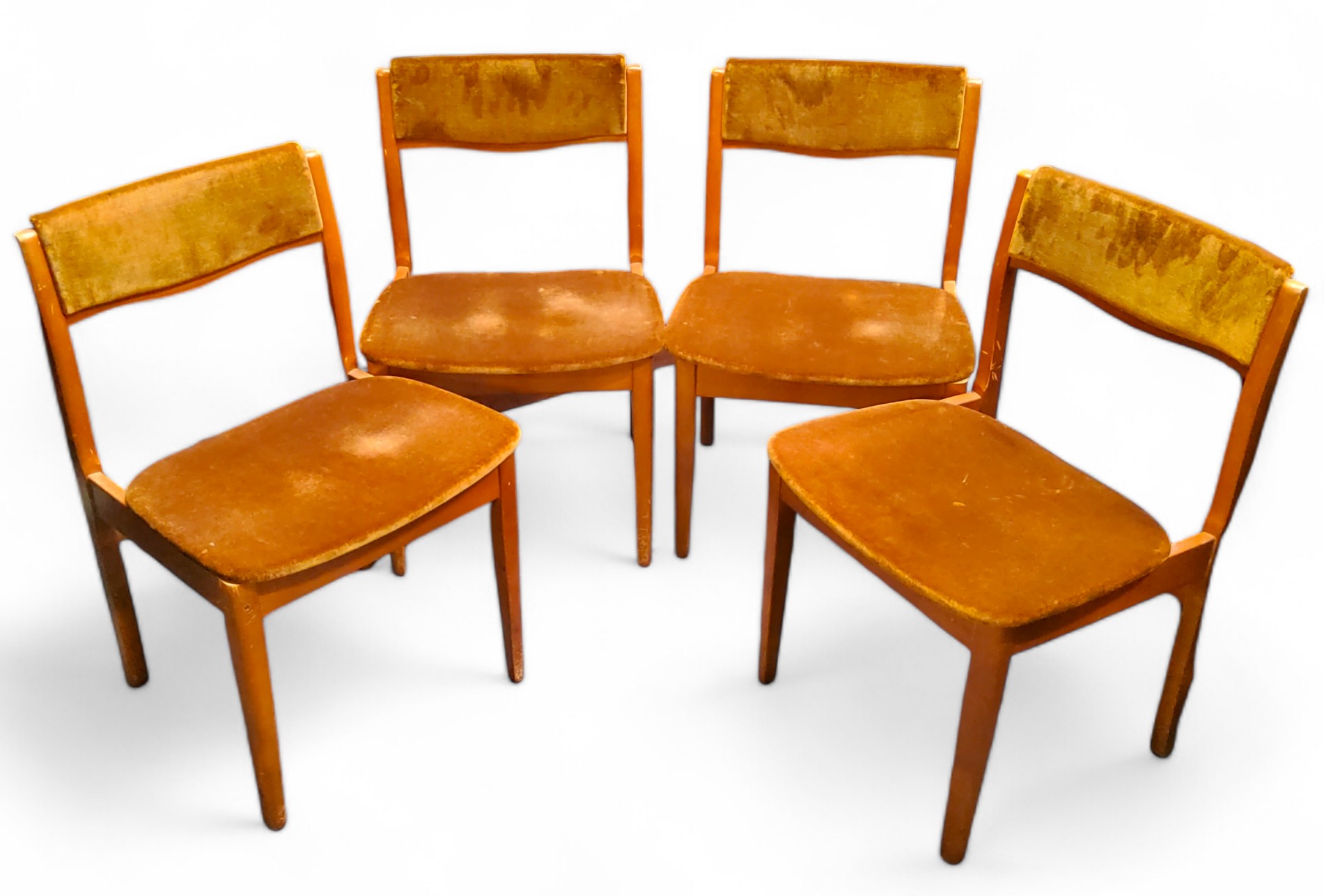 Four mid 20th century teak dining chairs with burnt orange upholstered ...