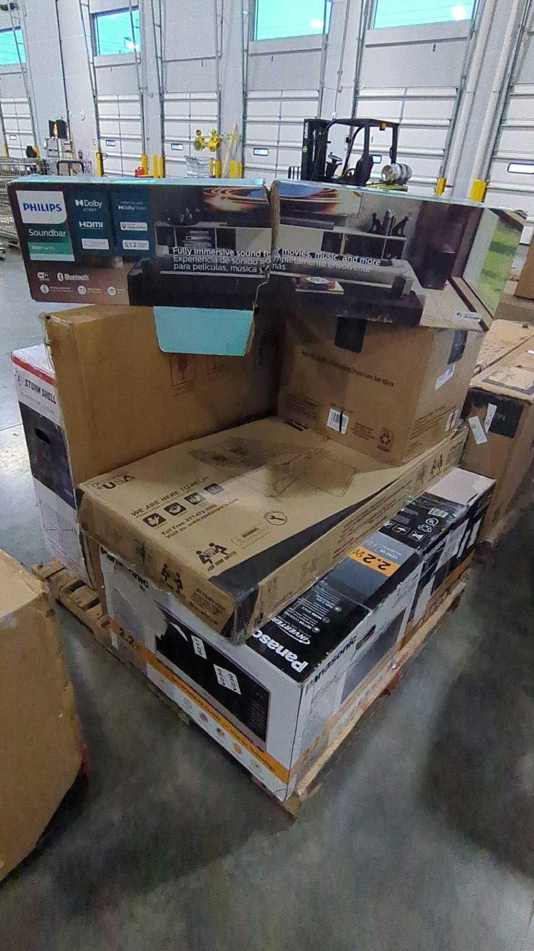 Pallet- Storm tv shell, Philips soundbar with box damage, Stoneware set ...