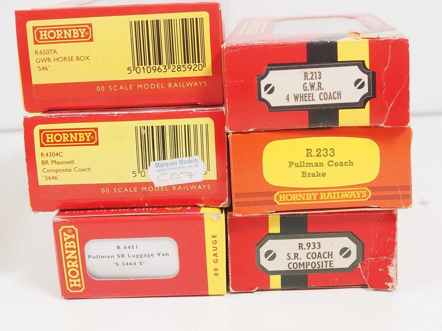 A group of OO gauge passenger coaches and horse boxes by HORNBY and ...