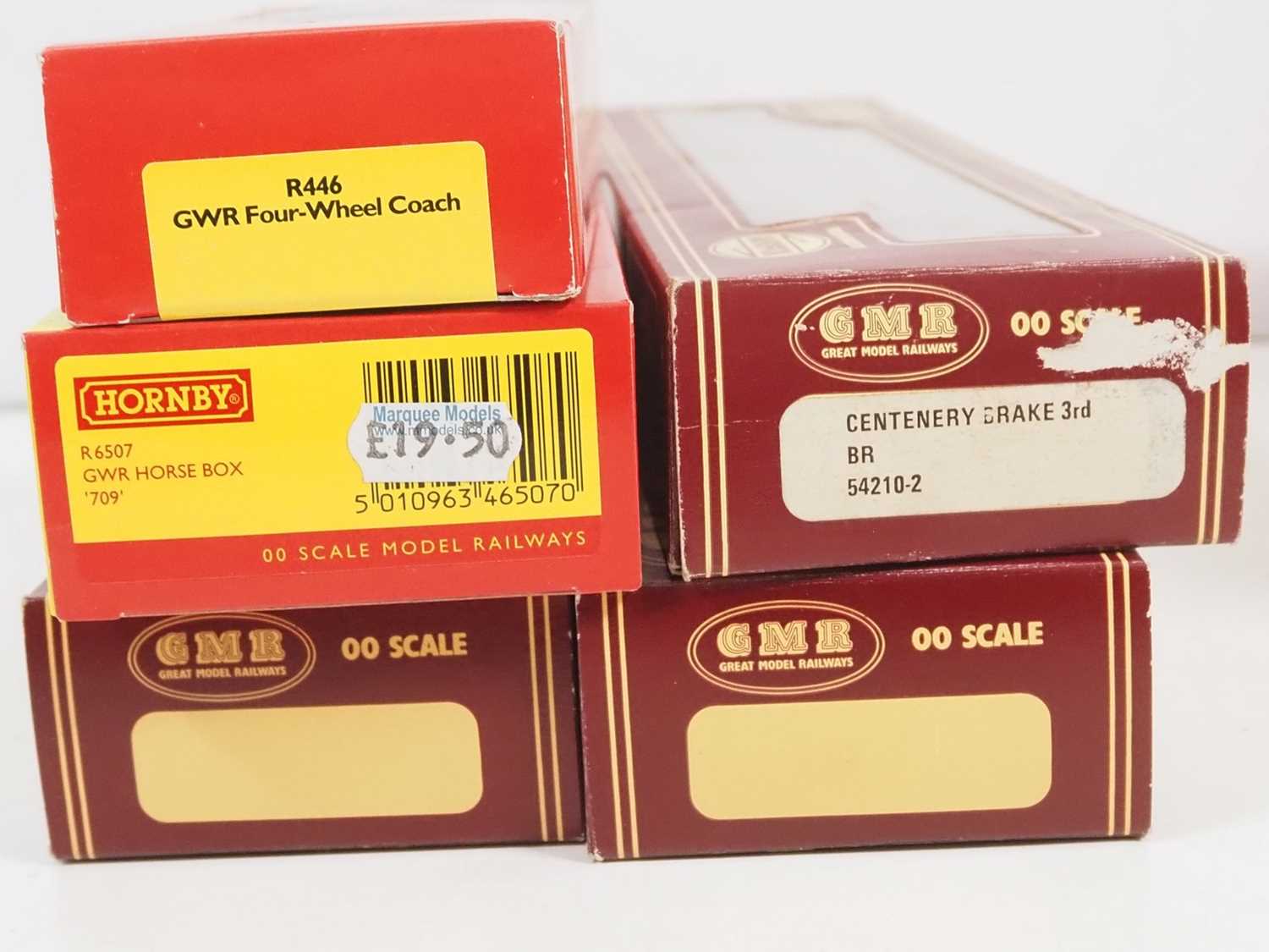 A group of OO gauge passenger coaches and horse boxes by HORNBY and ...