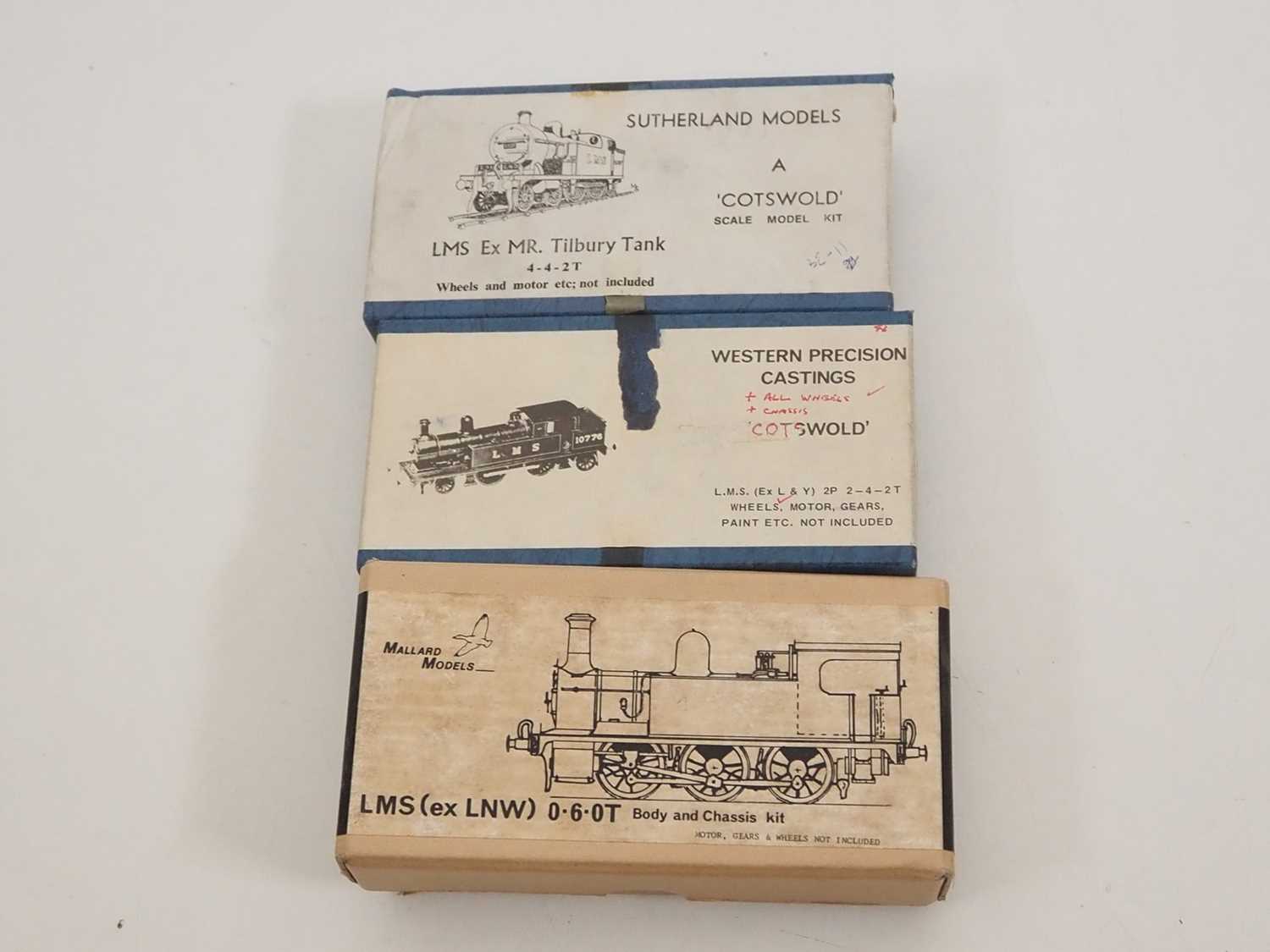 A group of unbuilt OO gauge white metal/brass locomotive kits by ...