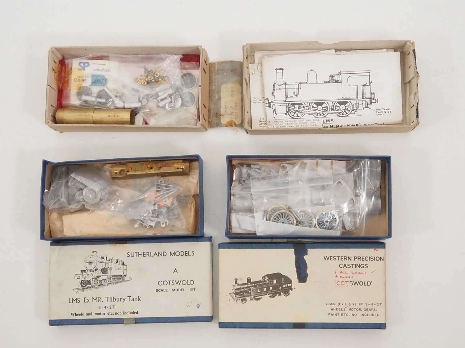 A group of unbuilt OO gauge white metal/brass locomotive kits by ...