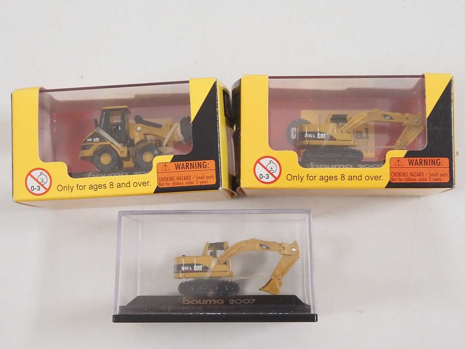 A group of mostly 1:50 scale diecast construction equipment by CONRAD ...