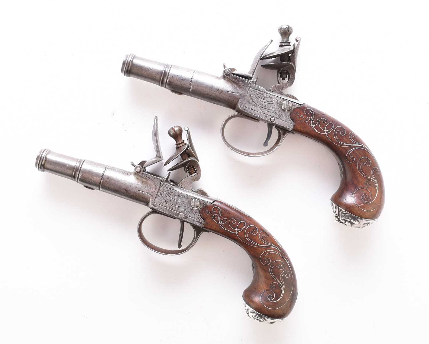A good pair of flintlock cannon-barrelled pocket pistols by Parkes ...