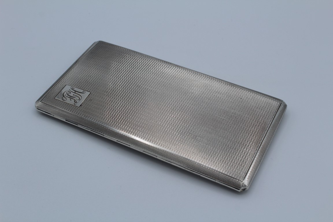 A sterling silver gilt lined cigarette case inscribed '' To Bandmaster ...