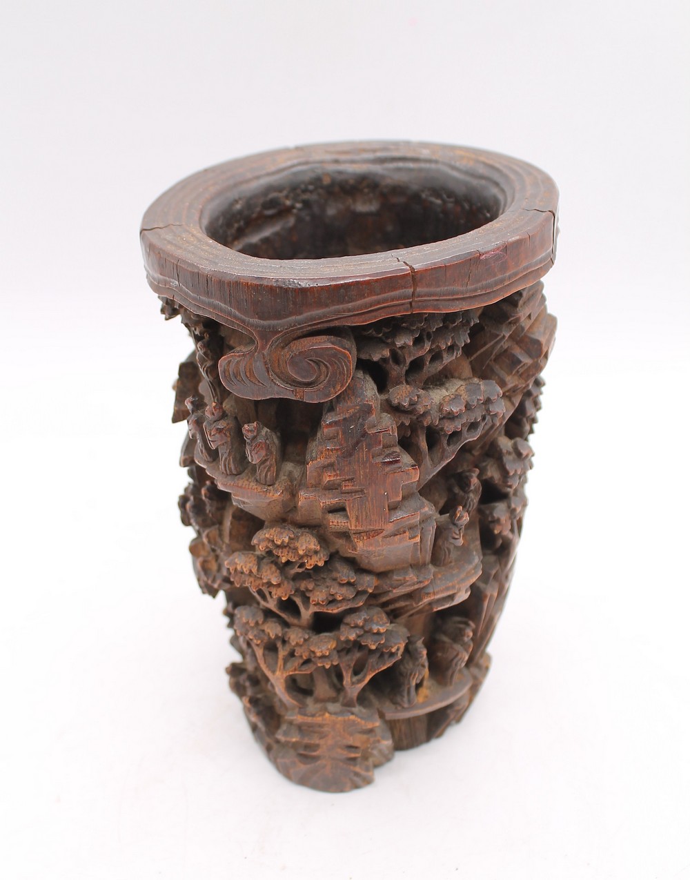A 19th century Chinese brush pot with carved chinoiseries and pagoda ...