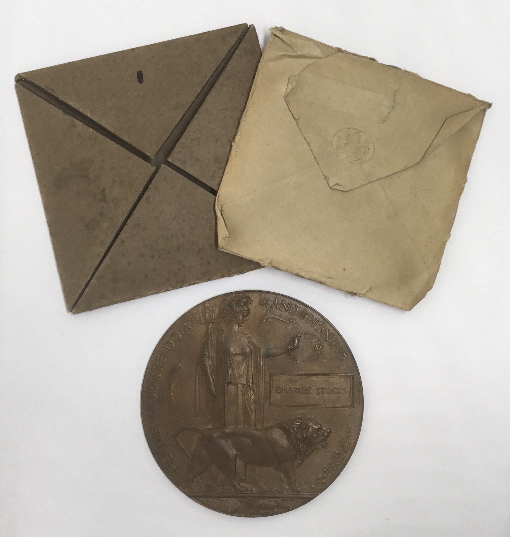 A WW1 era death plaque, named to Charles Stocks, complete with outer ...