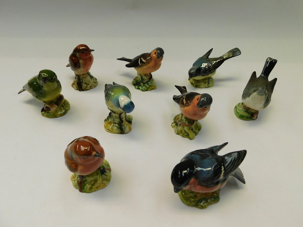 Beswick - nine ceramic bird figures inc. Blue Tit, Robin, Chaffinch etc ...