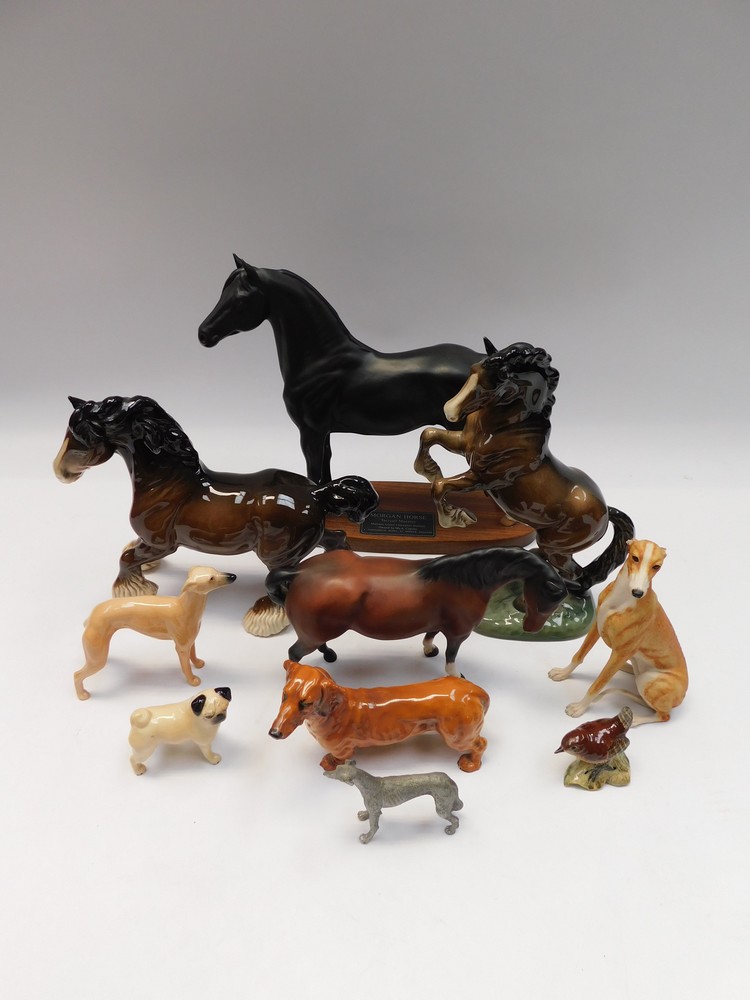 A collection of Beswick Royal Doulton and other animal figures, to ...