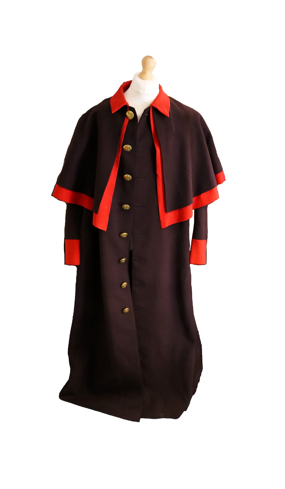 Two Coachman's capes in the colours of dark brown, as worn by the ...