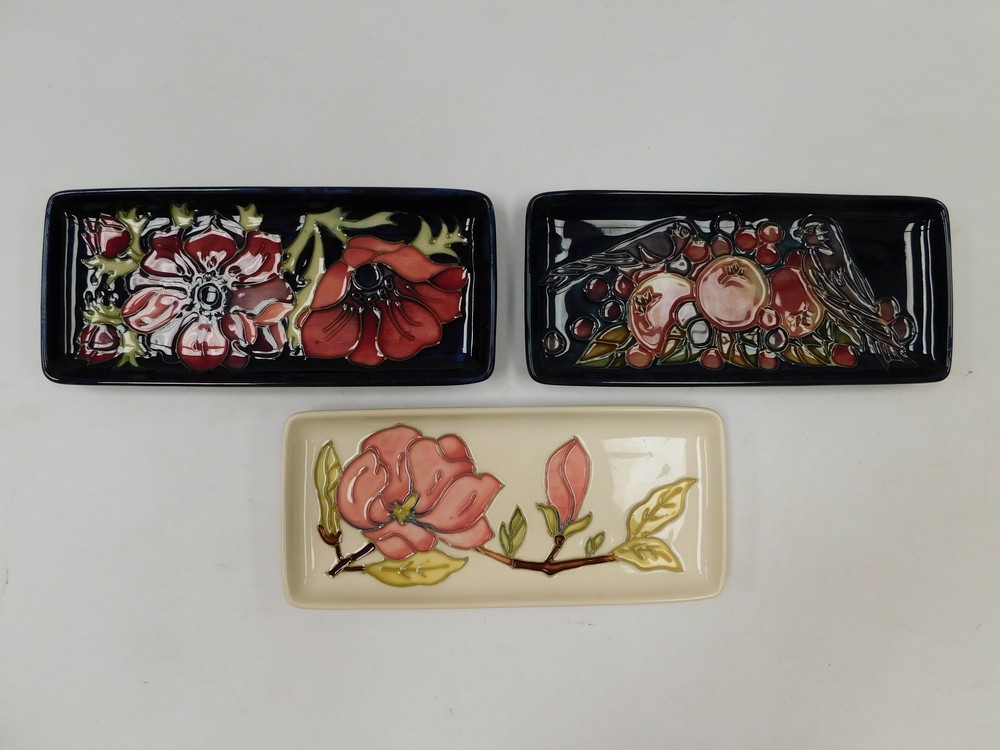 Moorcroft pottery: 3 rectangular pin dishes 'Magnolia' on a cream ...