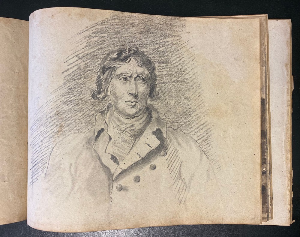 Luddism. A manuscript album featuring an illustration of someone being ...