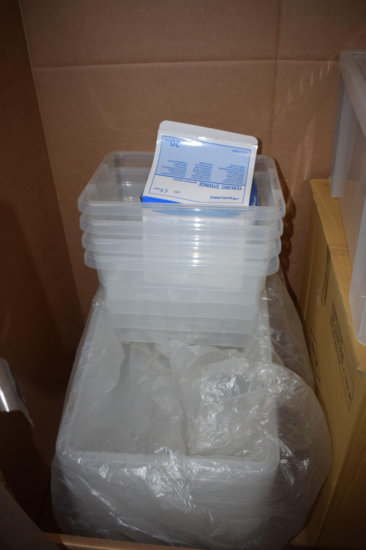 A selection of plastic storage boxes - new (SW)