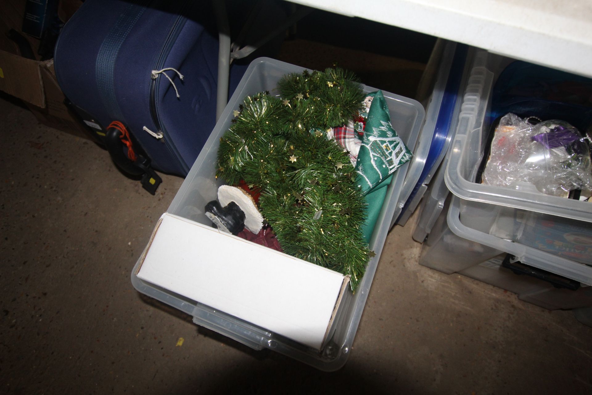 Five boxes containing Christmas related items, decorations etc.