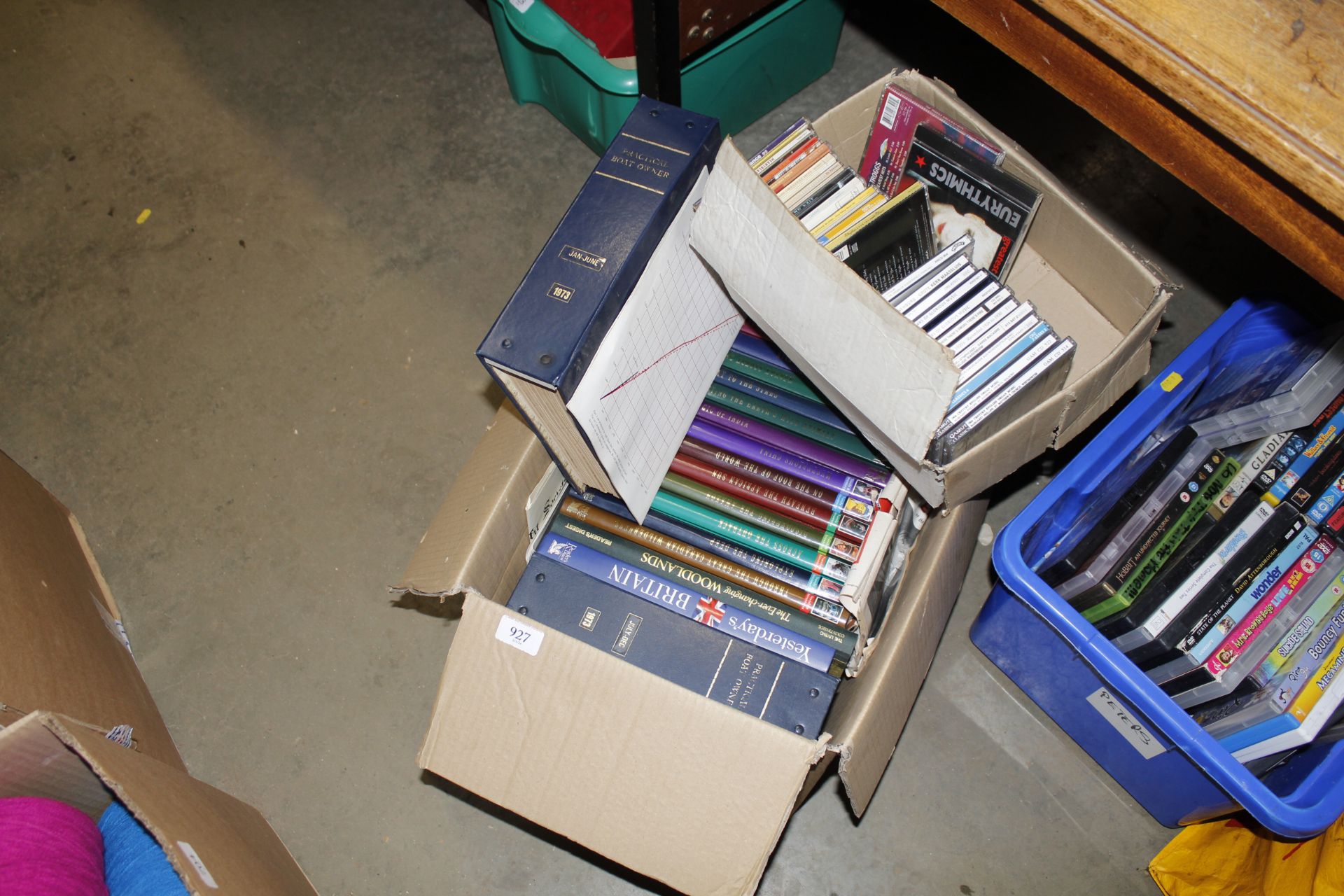 Two boxes of books and CDs
