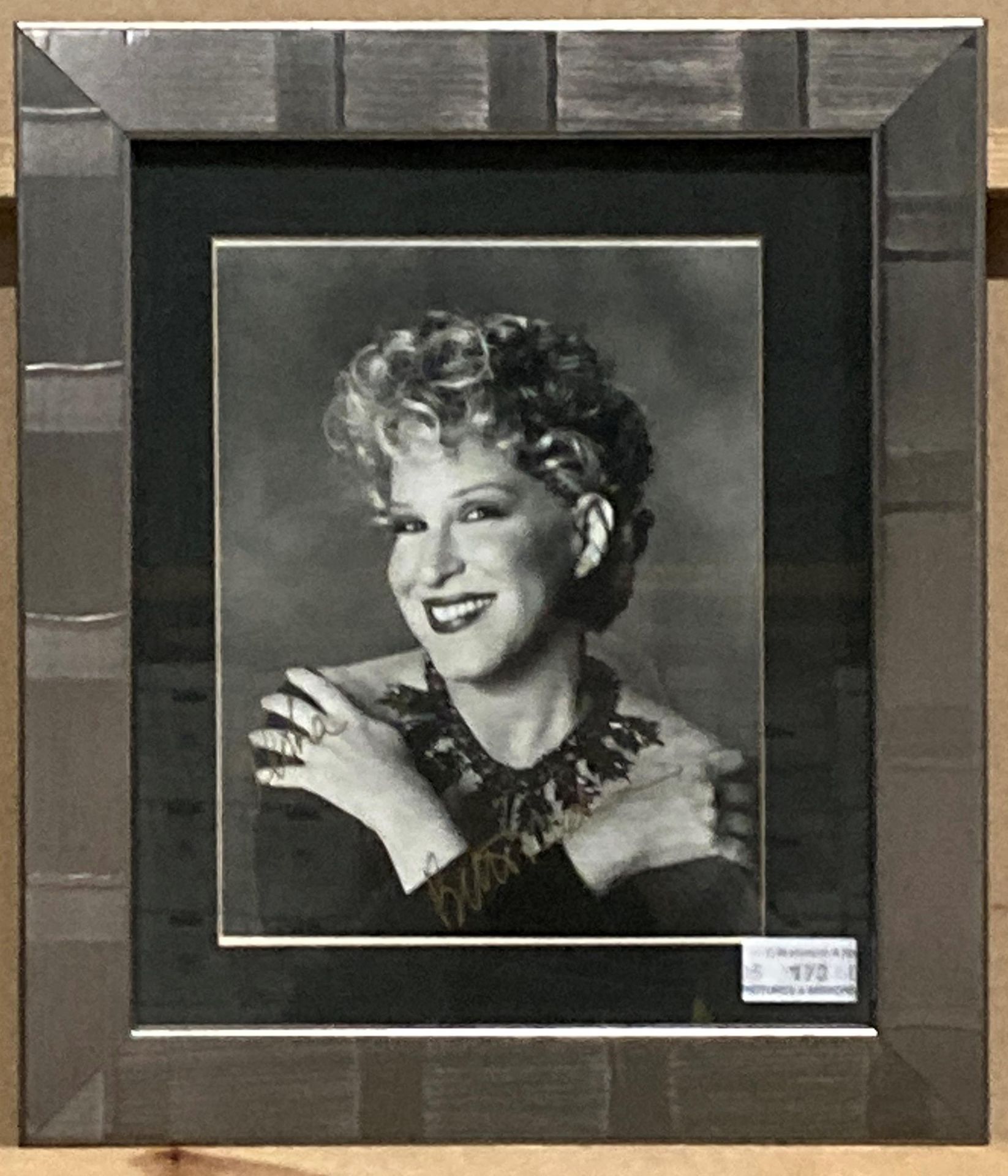 Framed photograph of Bette Midler, signed in gold pen 'Aloha Bette ...