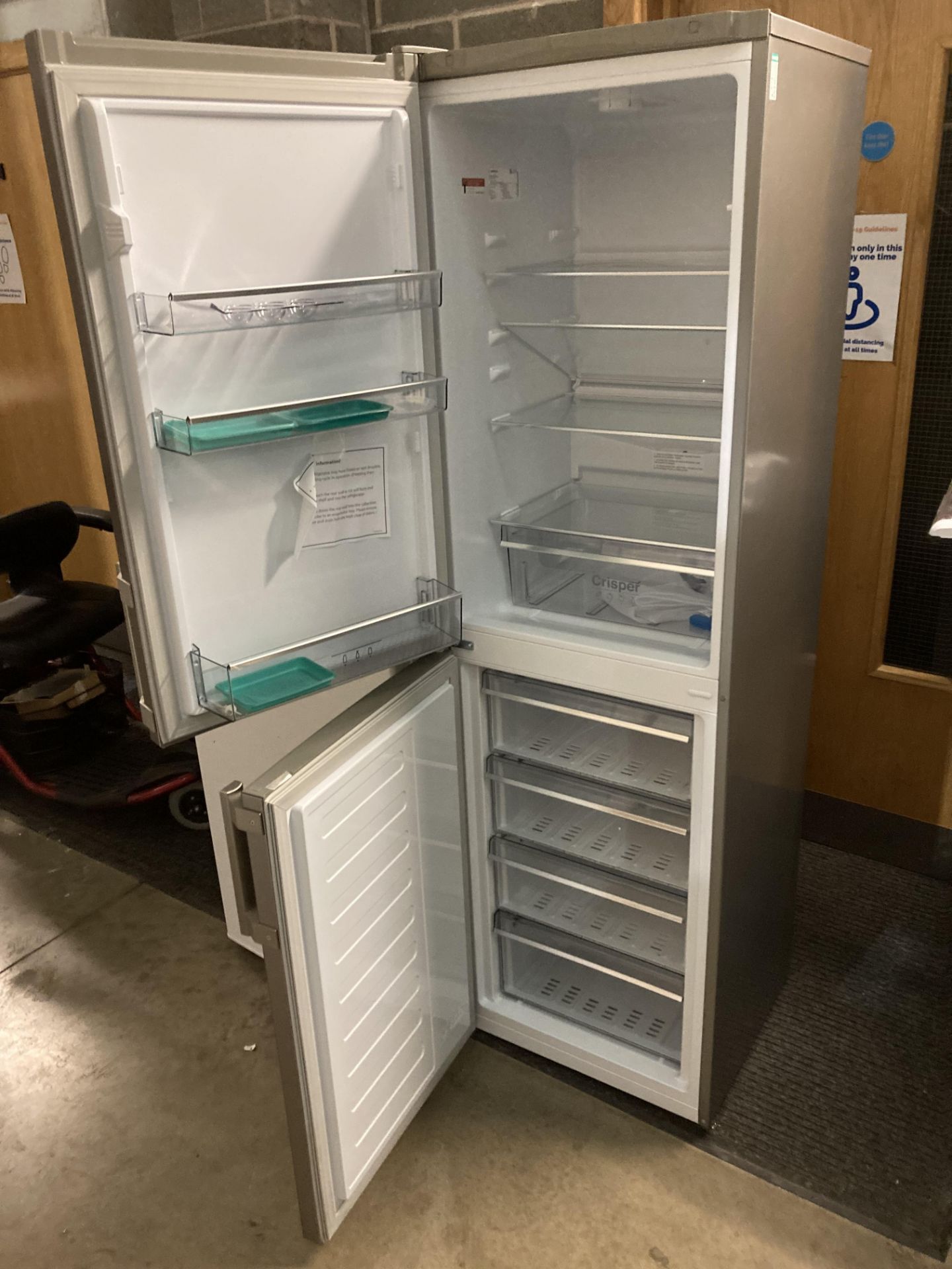 Grundig upright fridge freezer (saleroom location: PO)