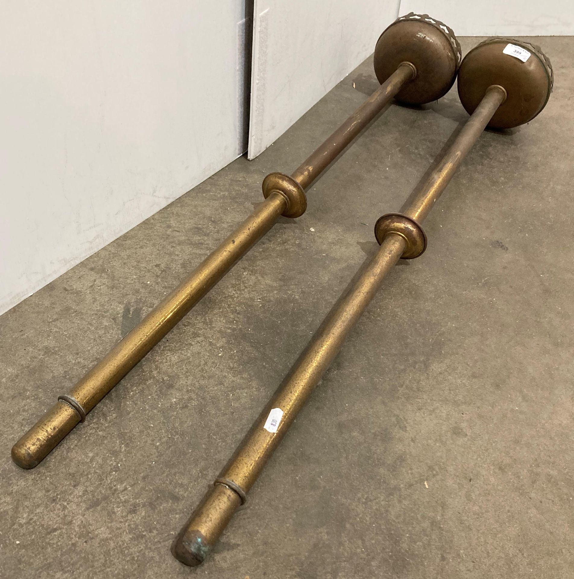 A pair of brass Medieval style wall hung torches/candle holders, each ...