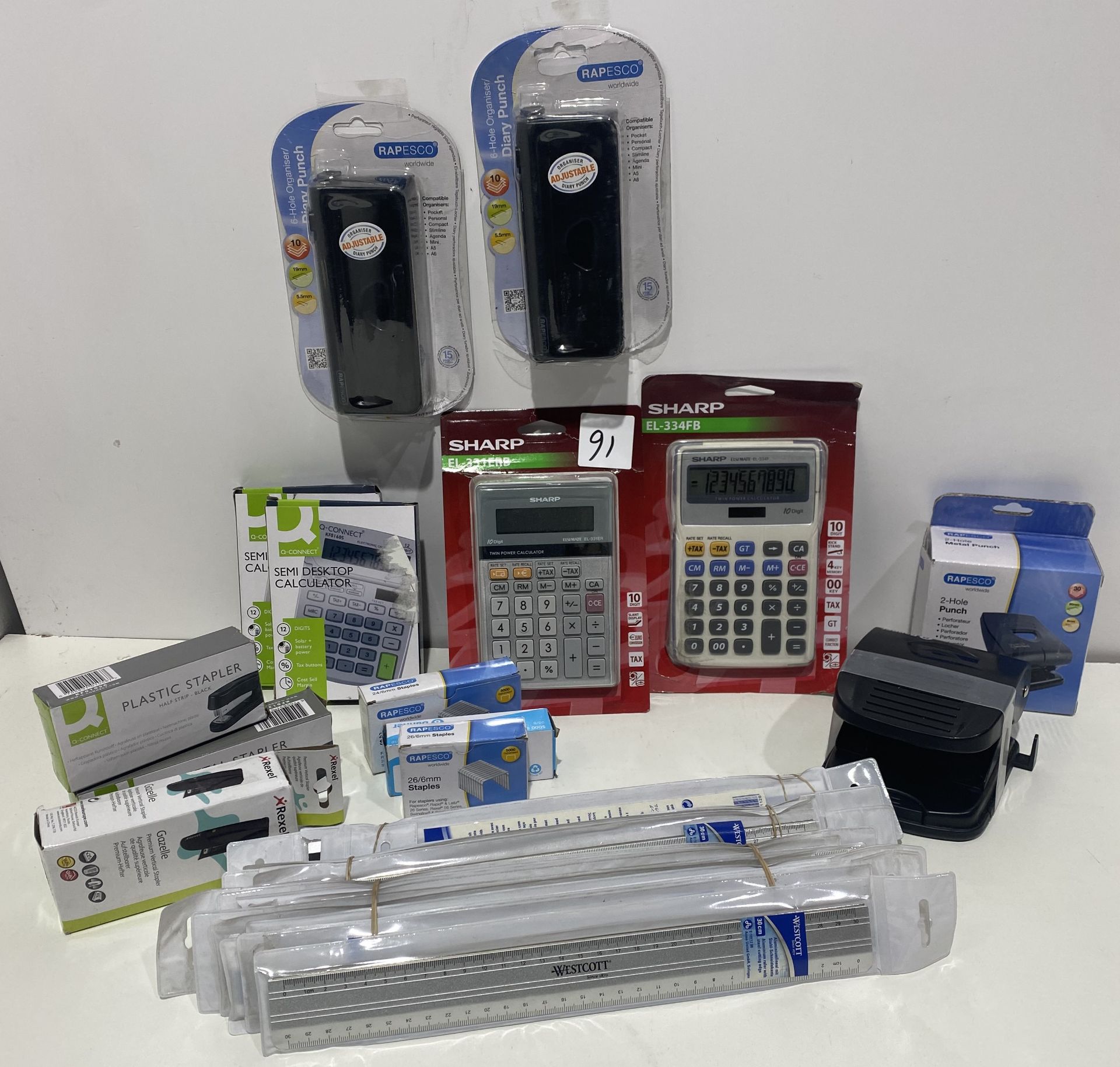 Job lot new - 4 x calculators, 4 x hole punch 2 hole, 3 x staplers, 3 x ...