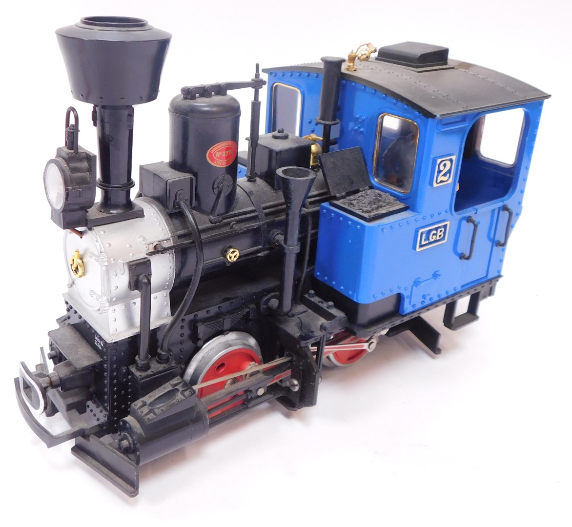 An LGB by Lehmann G scale locomotive and coaches, including an 0-4-0 ...