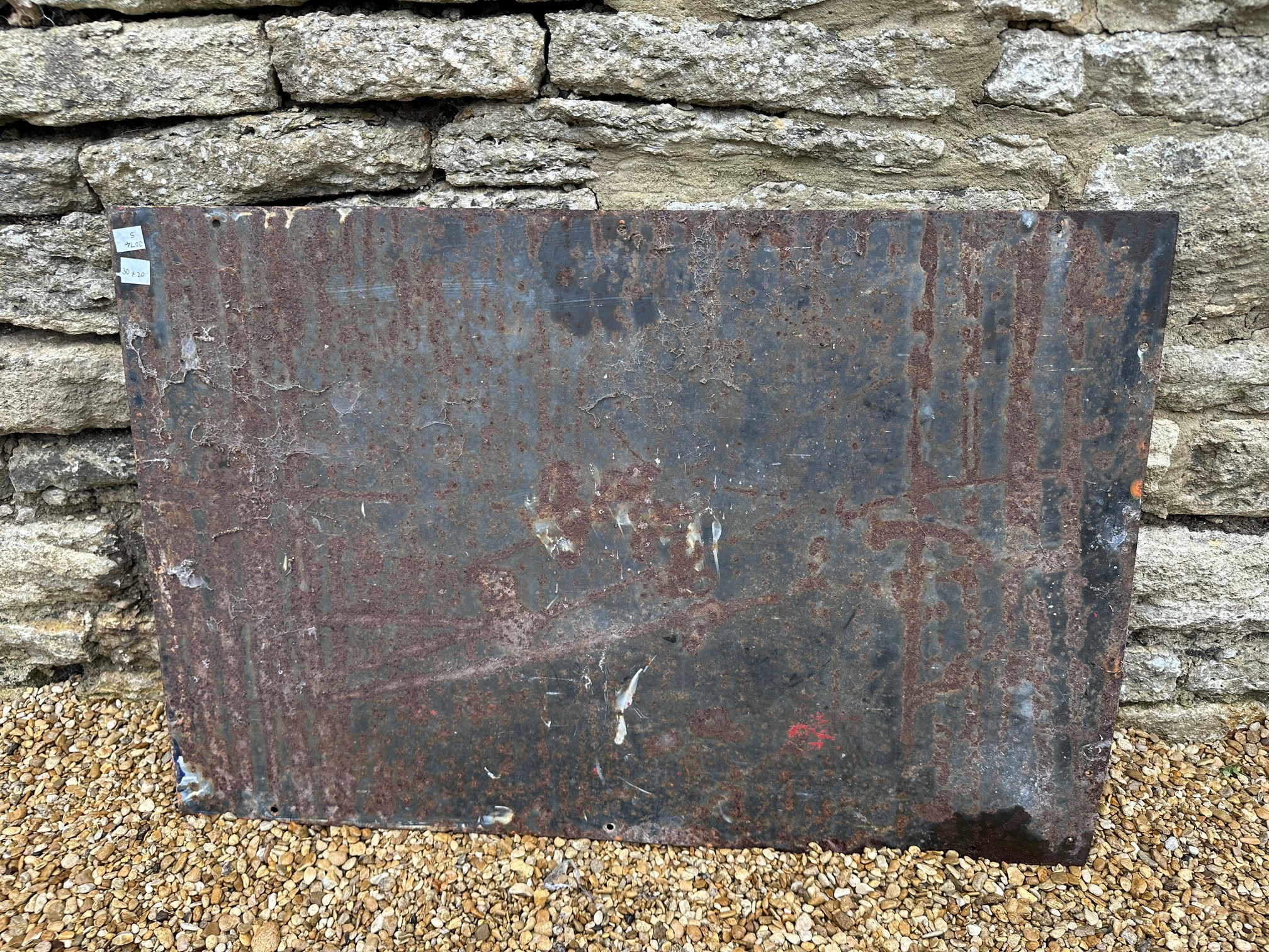 An AC Plug Stockist enamel advertising sign 'Garage on Right', 30 x 20".