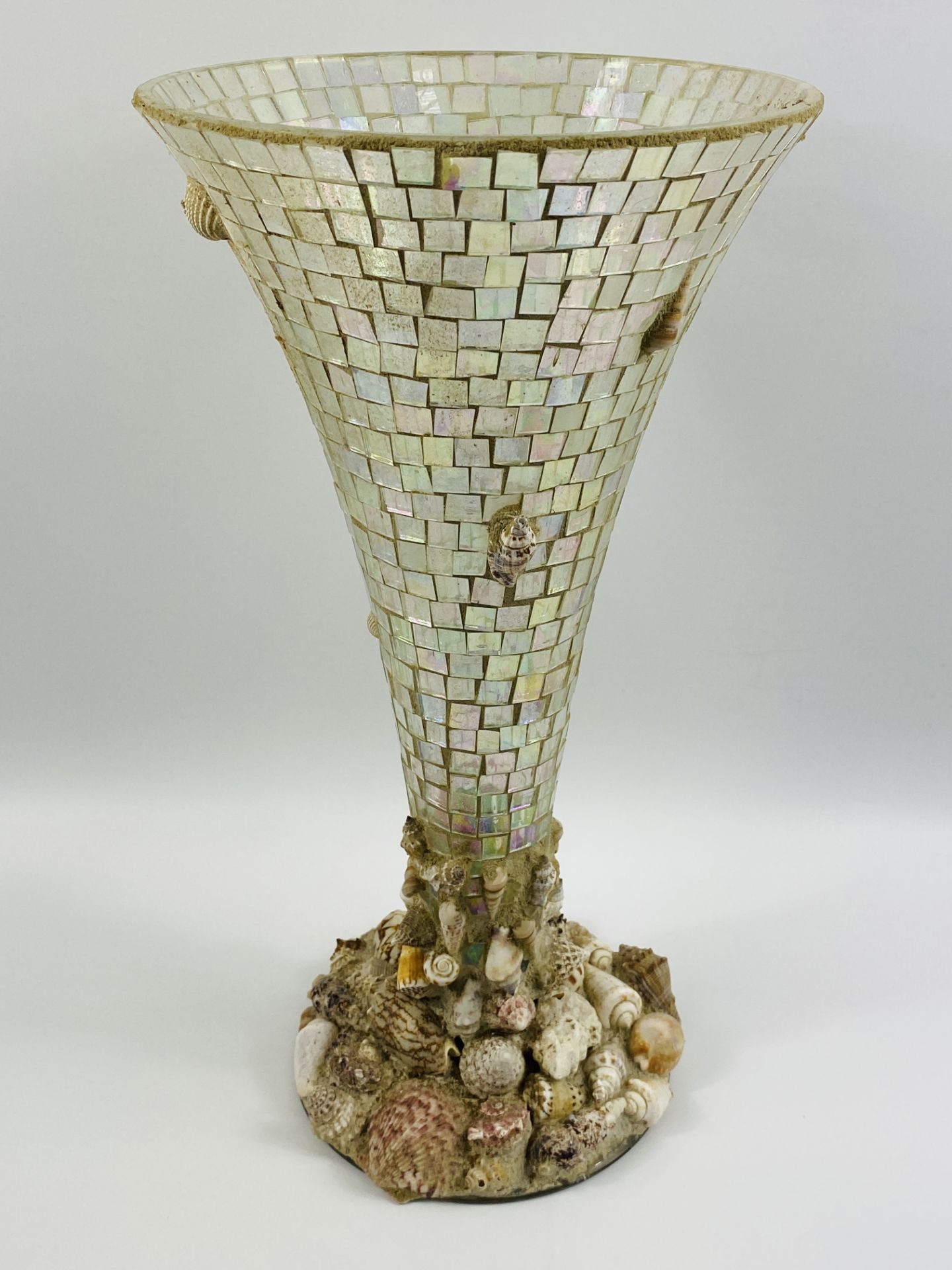 A large and unusual decorative trumpet shaped vase with small ...