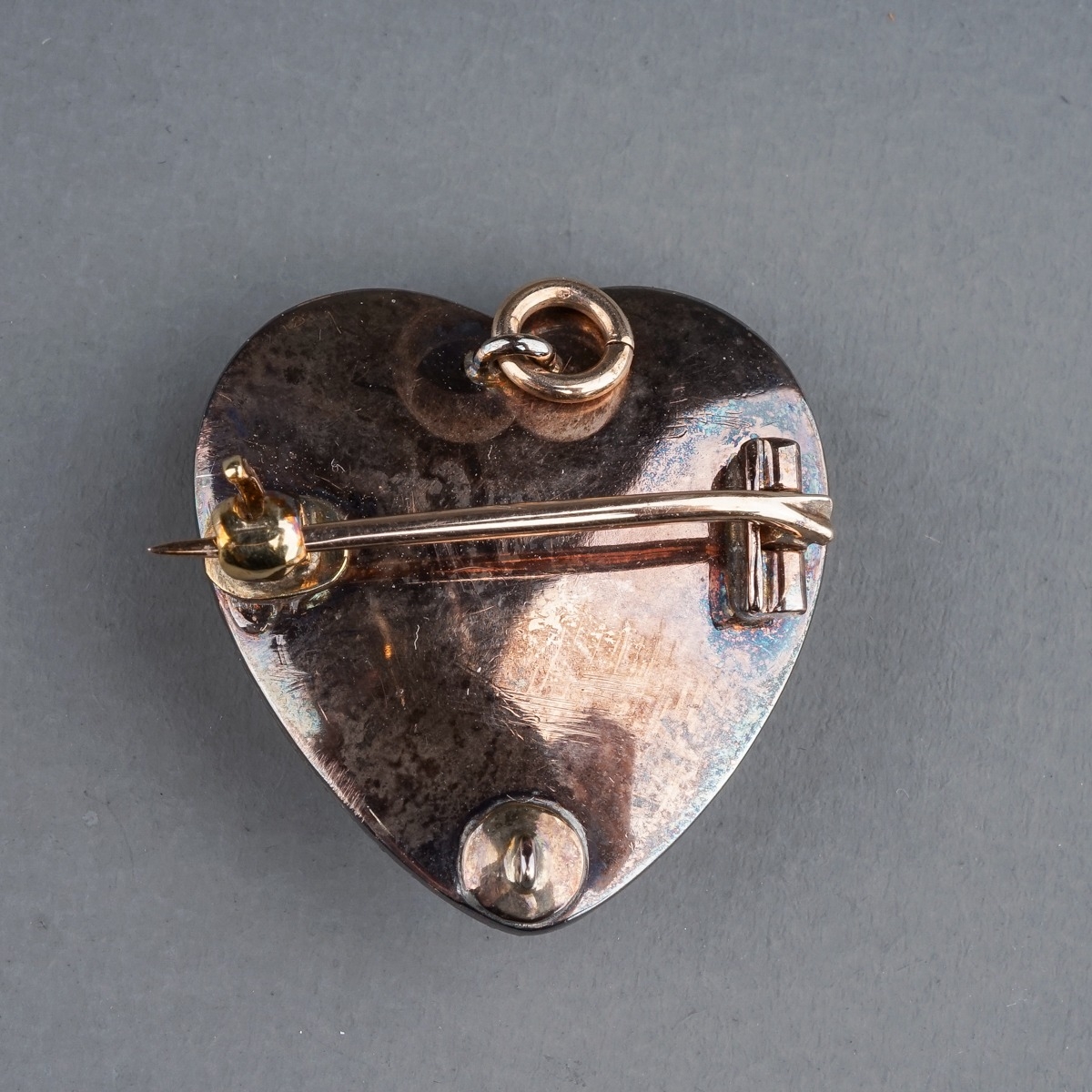 A late 19th century diamond and enamel heart shaped brooch/pendant, the ...