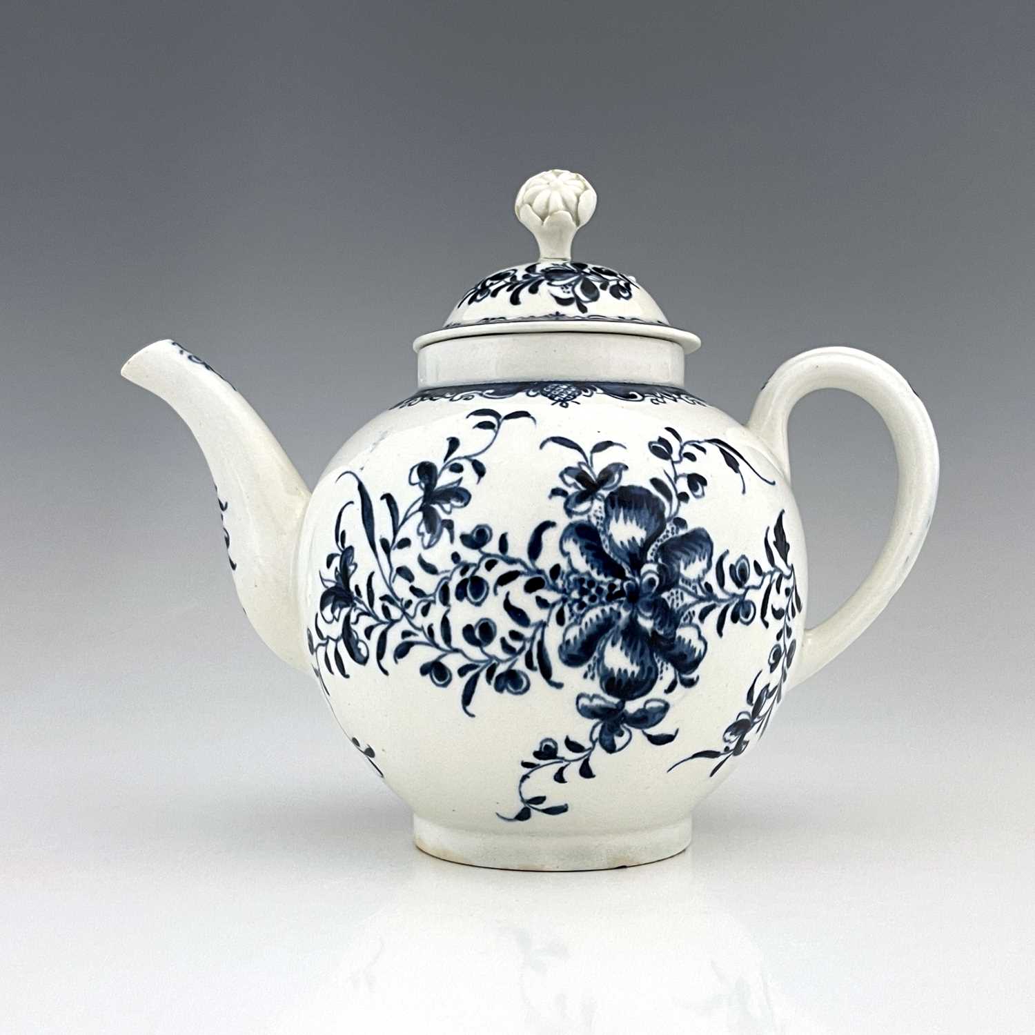 A Lowestoft blue and white porcelain teapot and cover, crescent mark ...