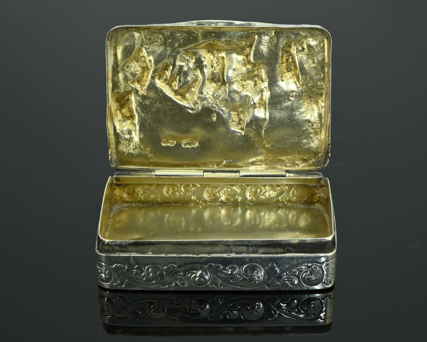 A Victorian silver snuff box, of rectangular form, the hinged cover ...