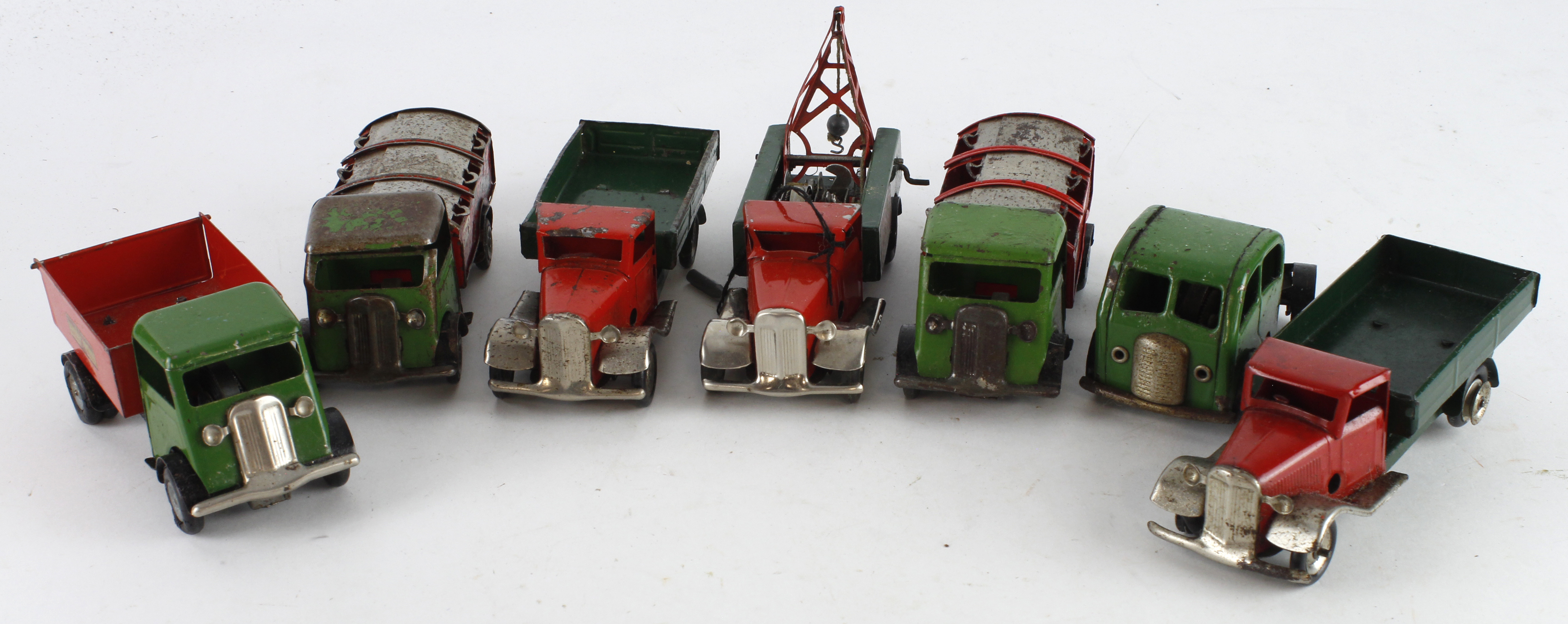 Triang Minic. Seven Triang Minic tinplate clockwork lorries (untested)