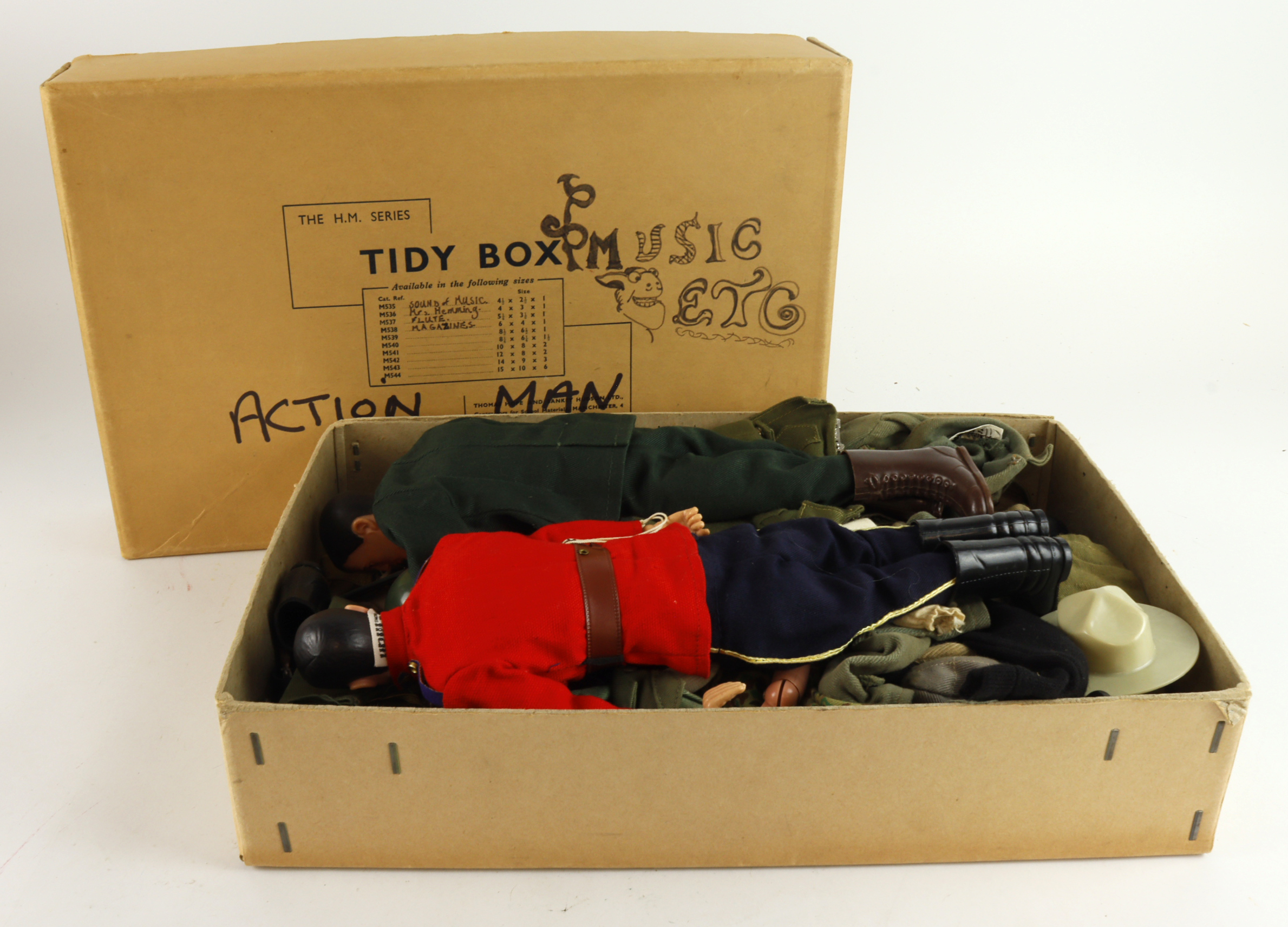 Action Man. Box containing a selection of clothing and various ...