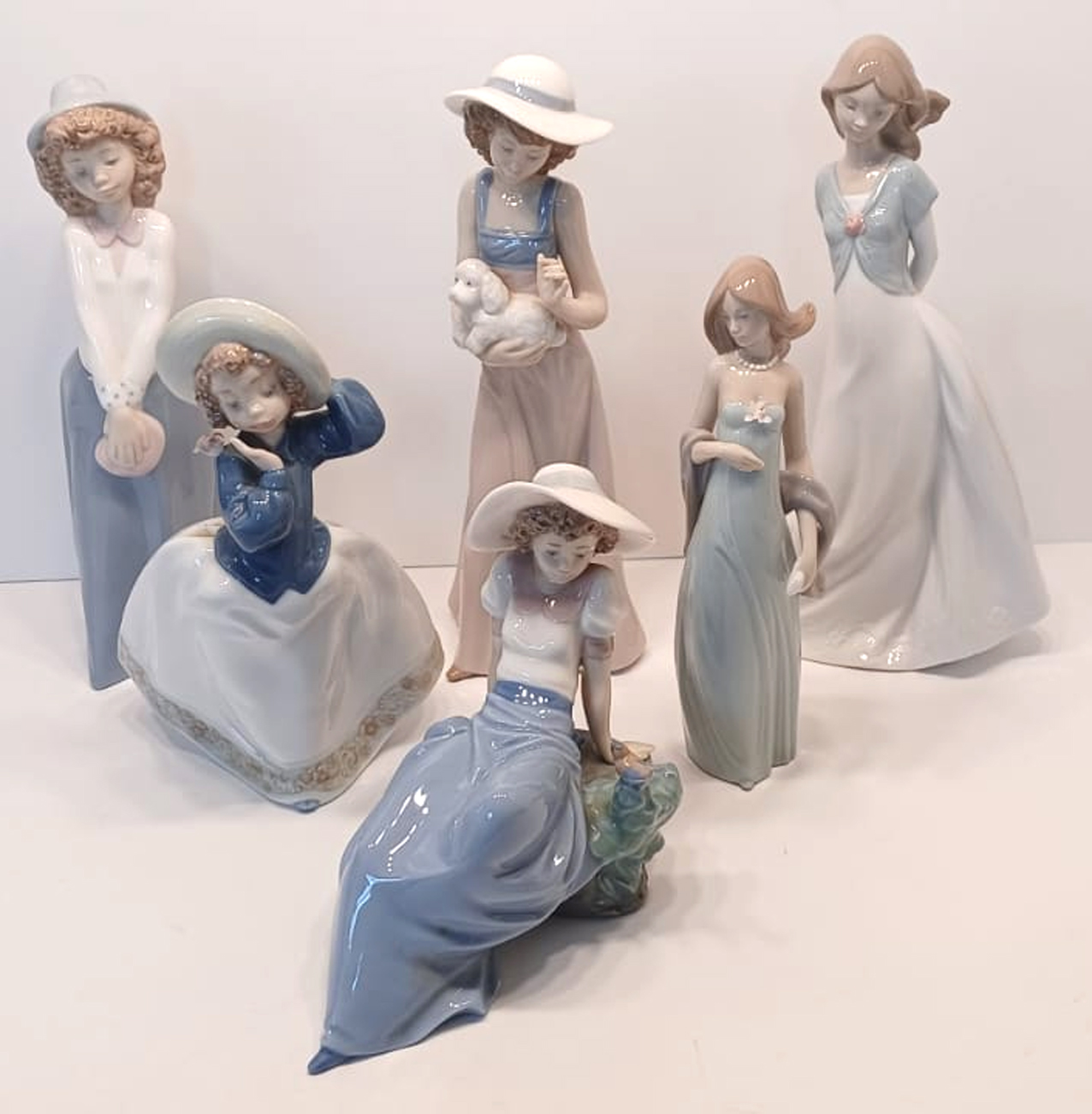A Lladro Girl And 5 Nao Figurines