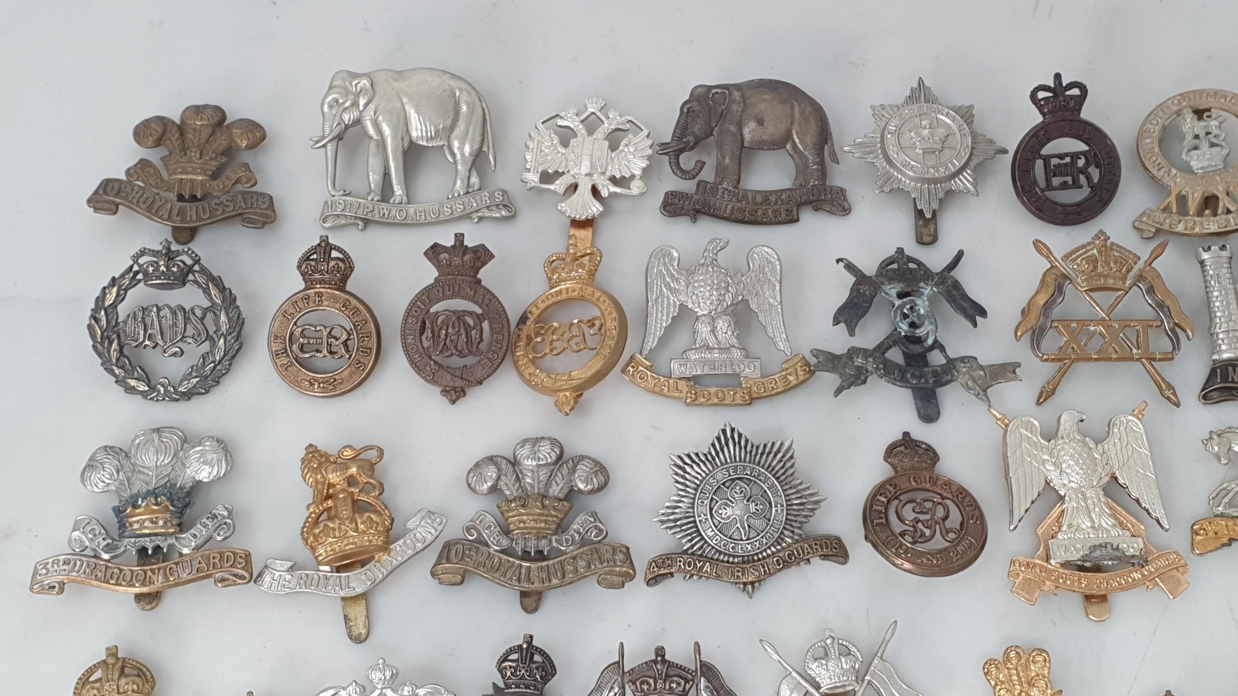 A collection of British Army Cavalry Badges