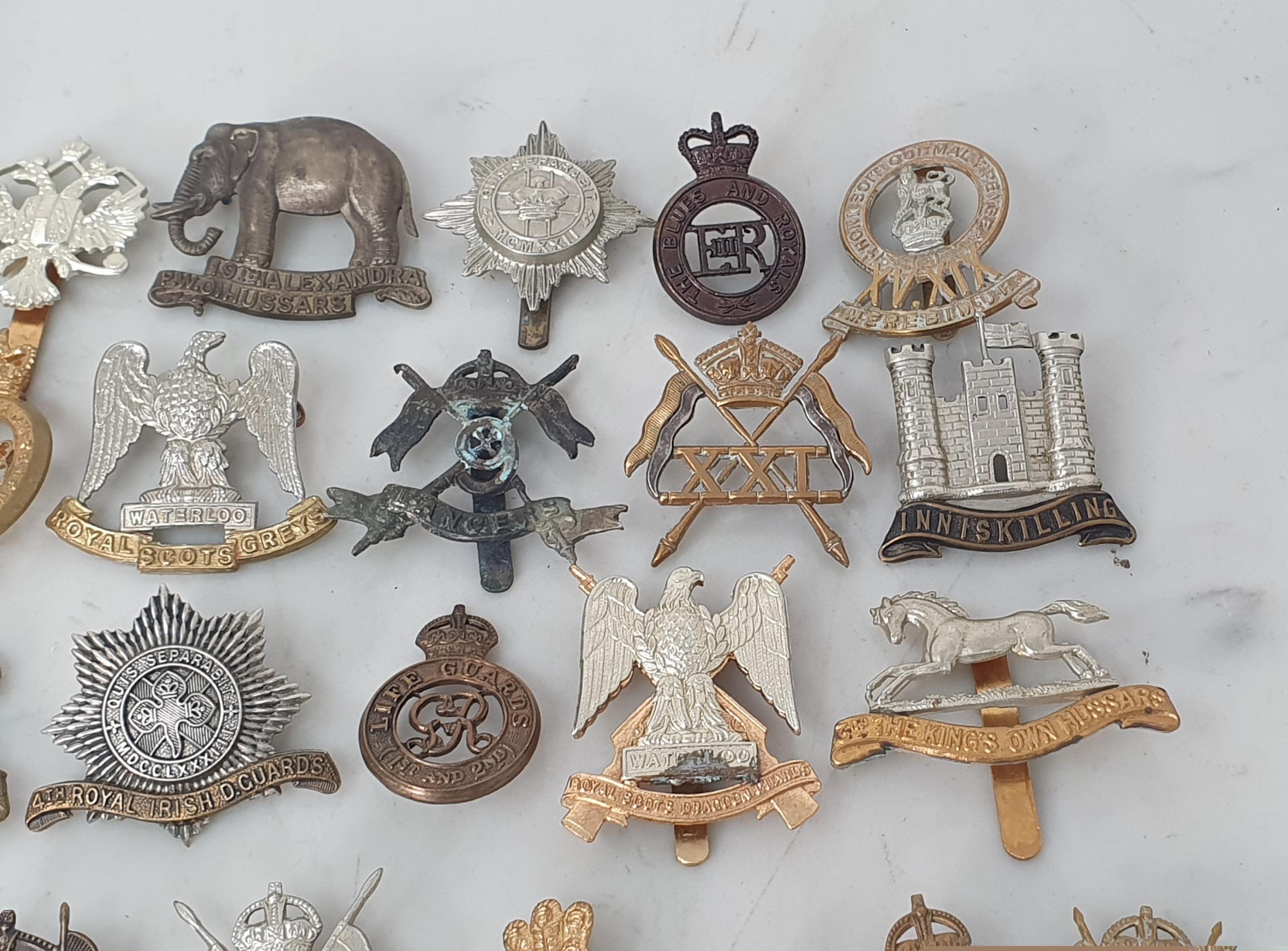A collection of British Army Cavalry Badges