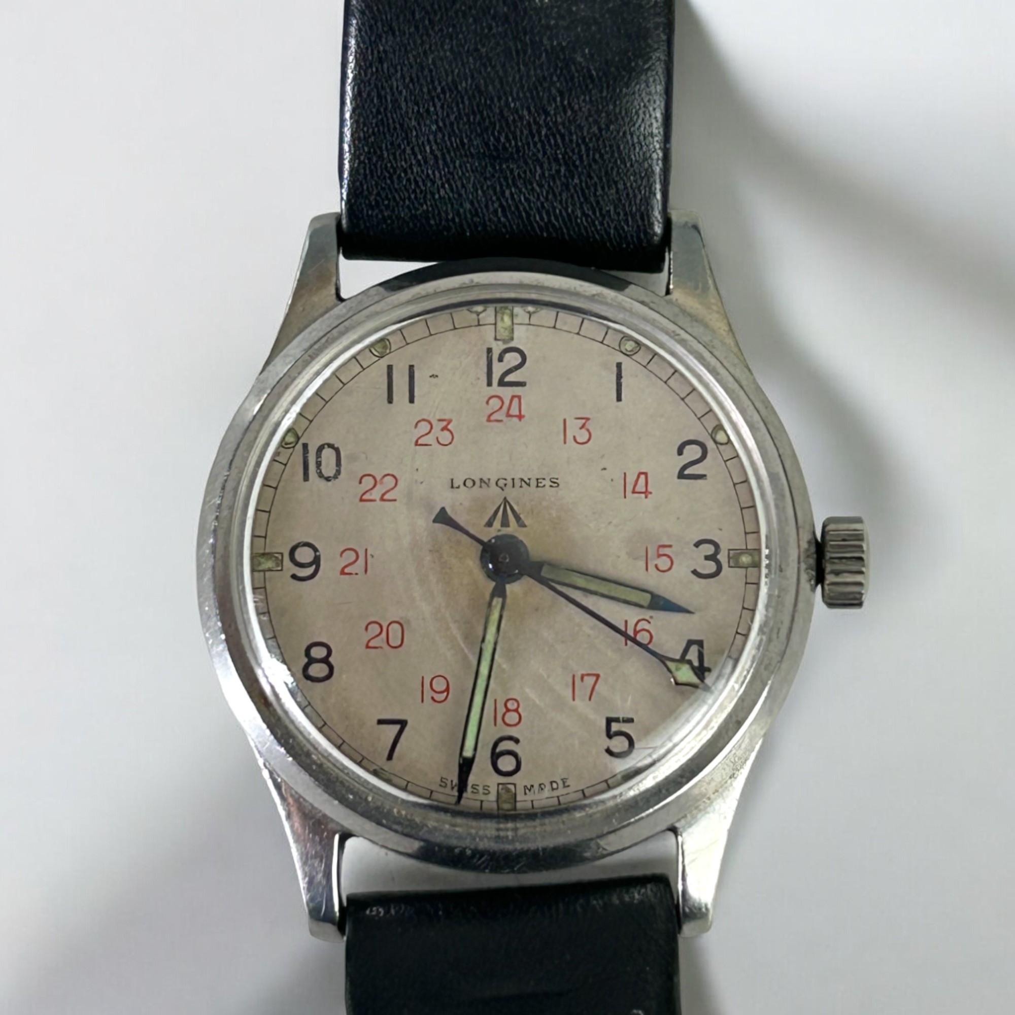 A 1940's Longines military issue wristwatch. With Broad arrow stamp to ...